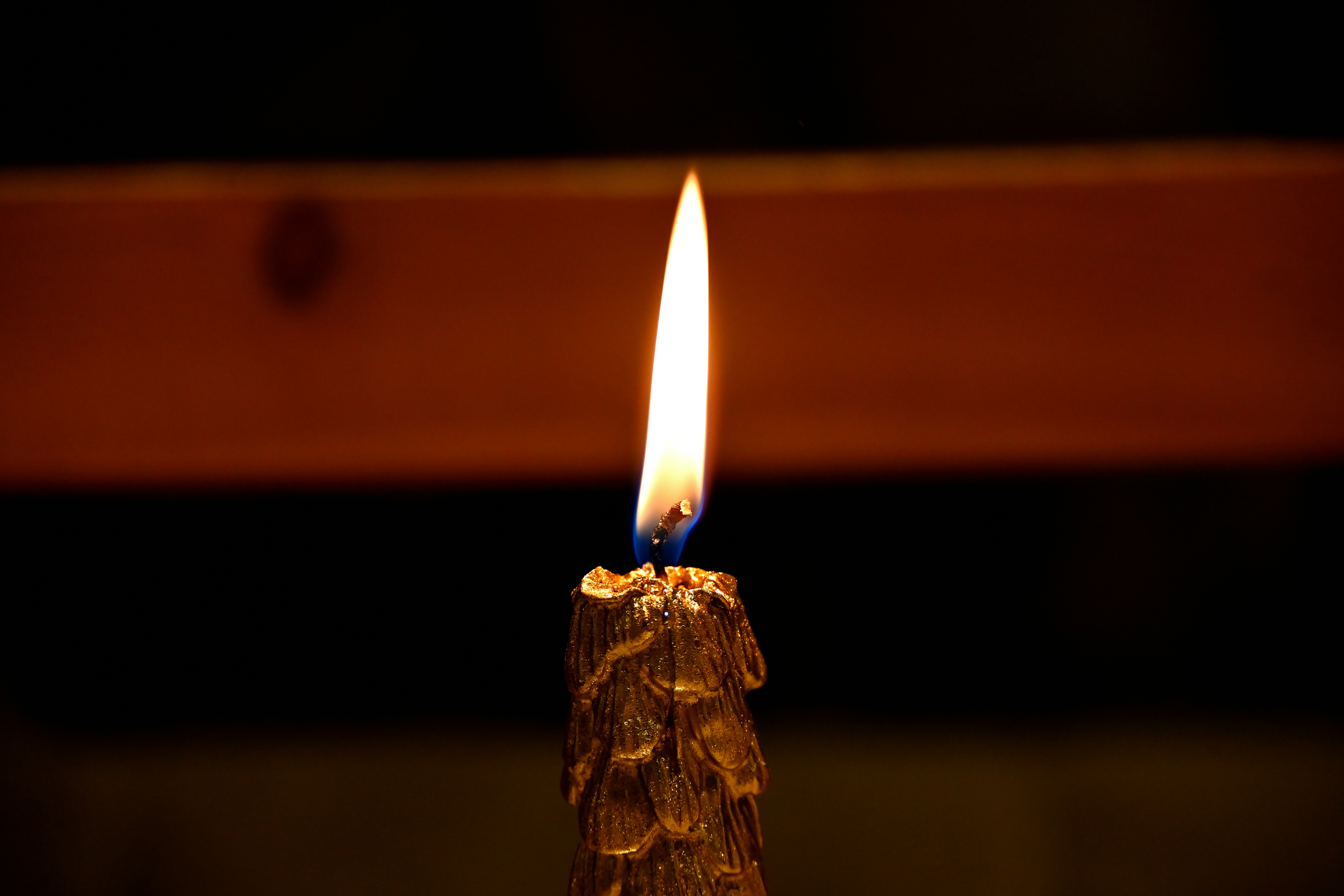 Illuminated Serenity: The Flame's Dance