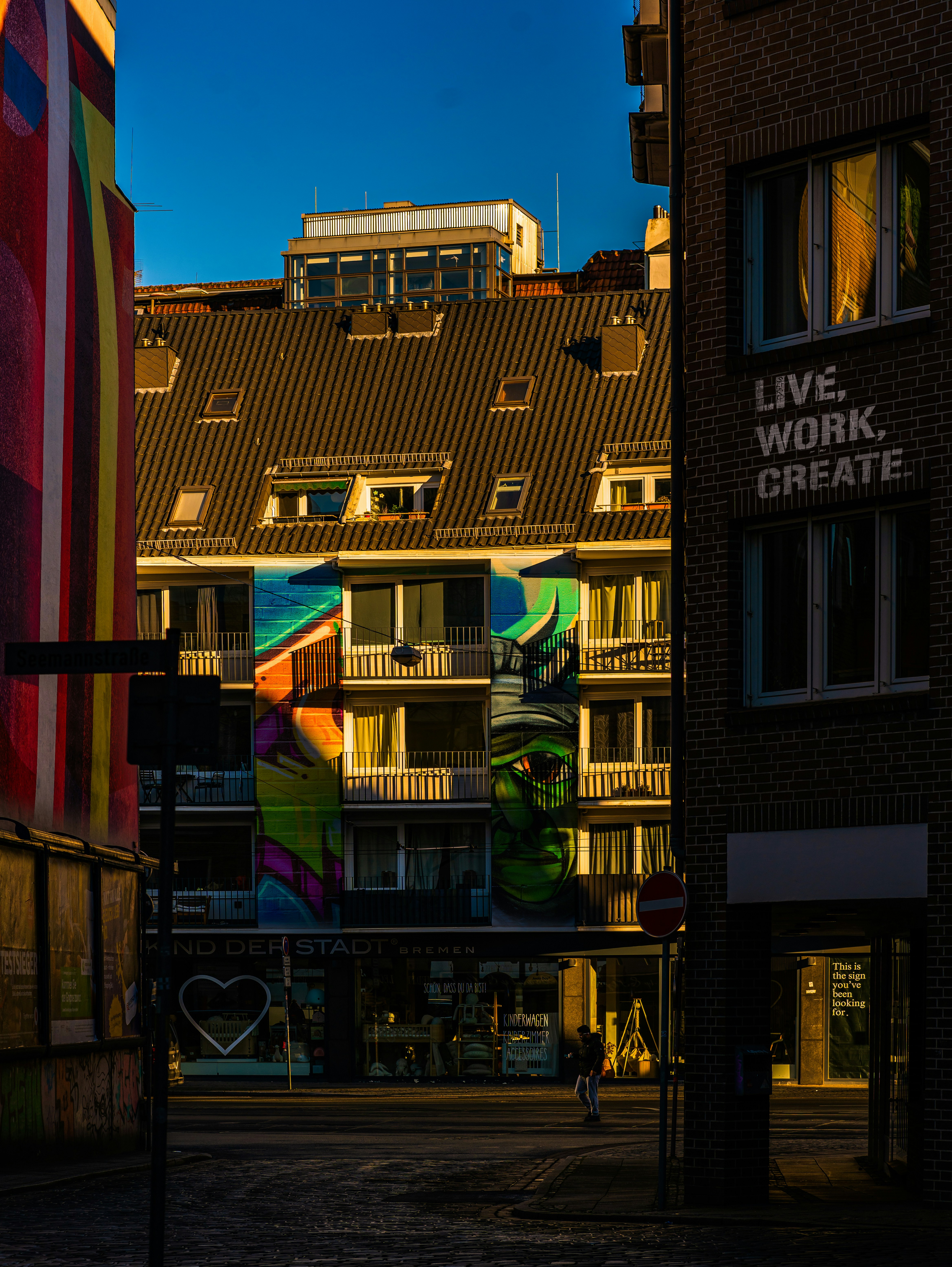 A building with a mural on the side of it photo – Free Bremen Image on ...