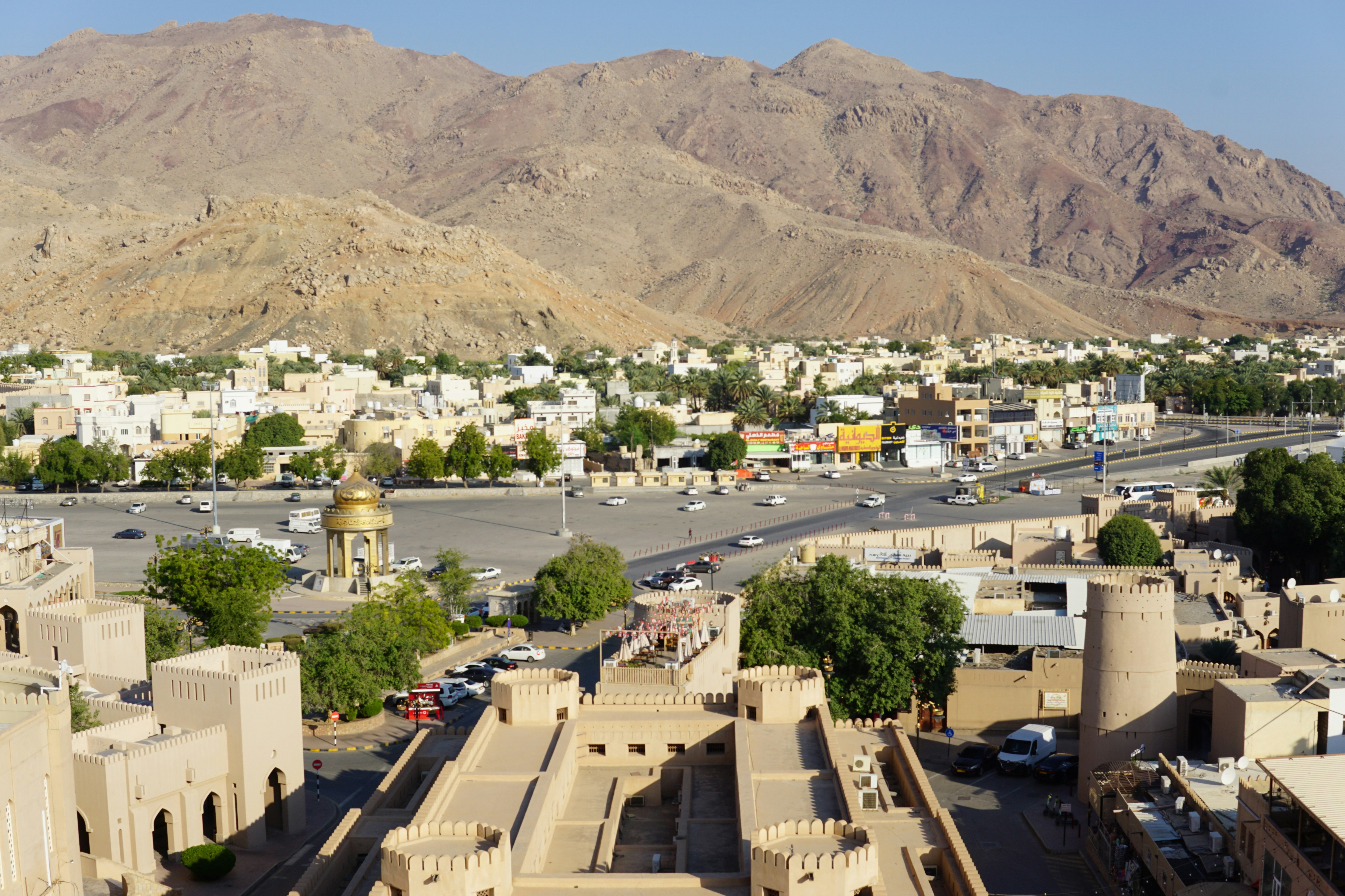Dome of Gold Anchors a Desert City from a Low-Angle Panorama