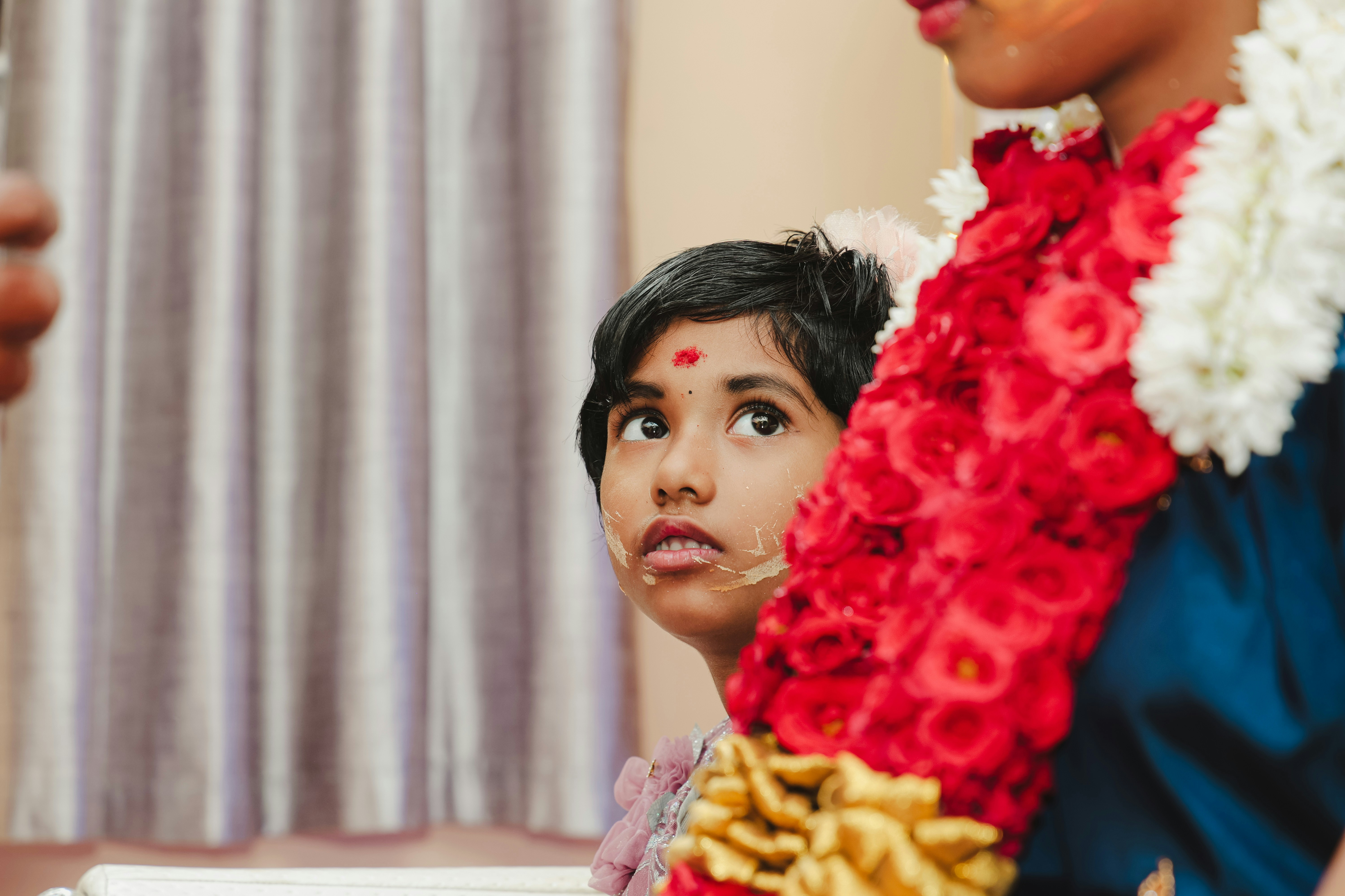A boy and a girl dressed up in flower leis photo – Free Kids Image on ...