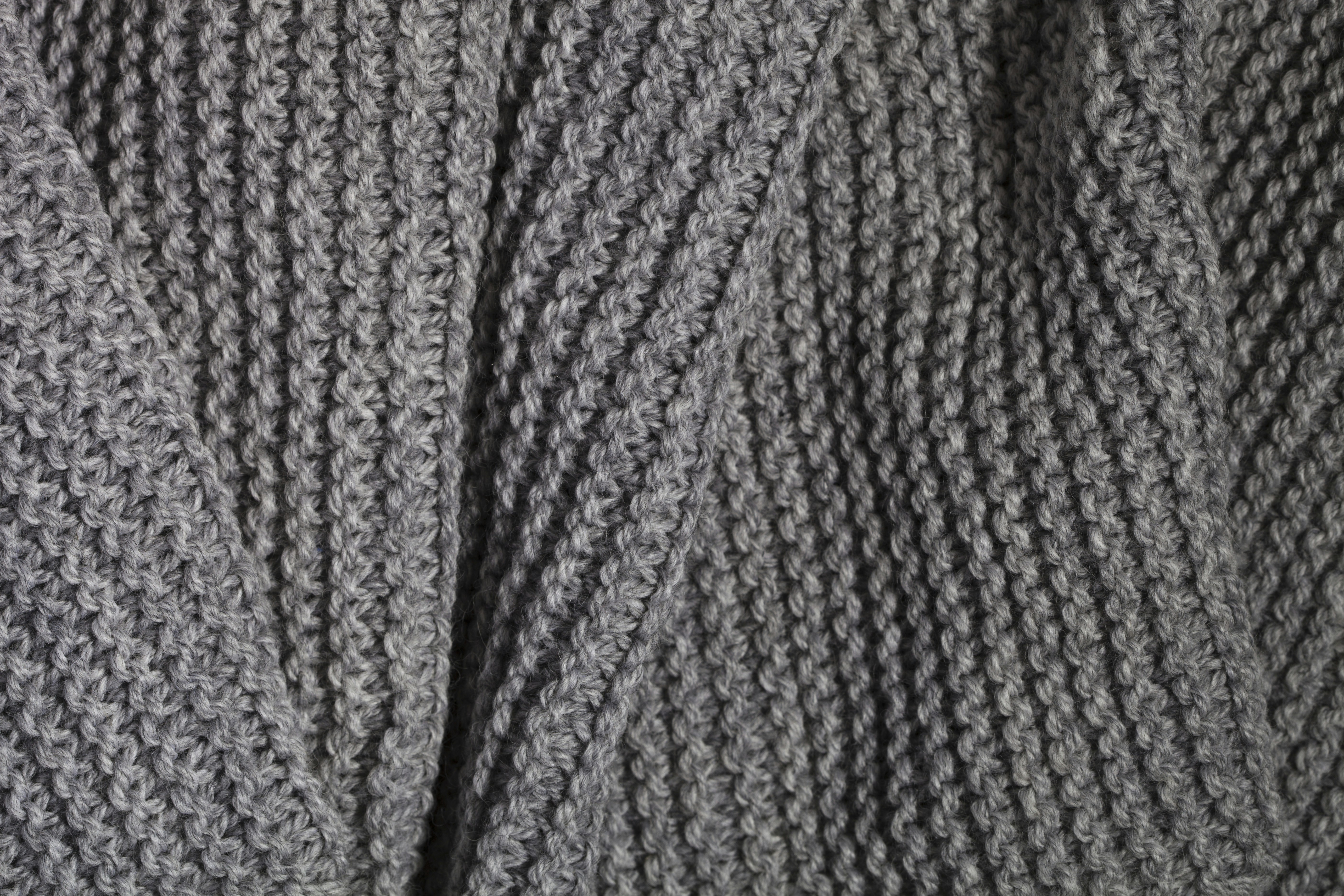 Close-Up of Dense Gray Cable Knit: Quiet Geometry in Wool