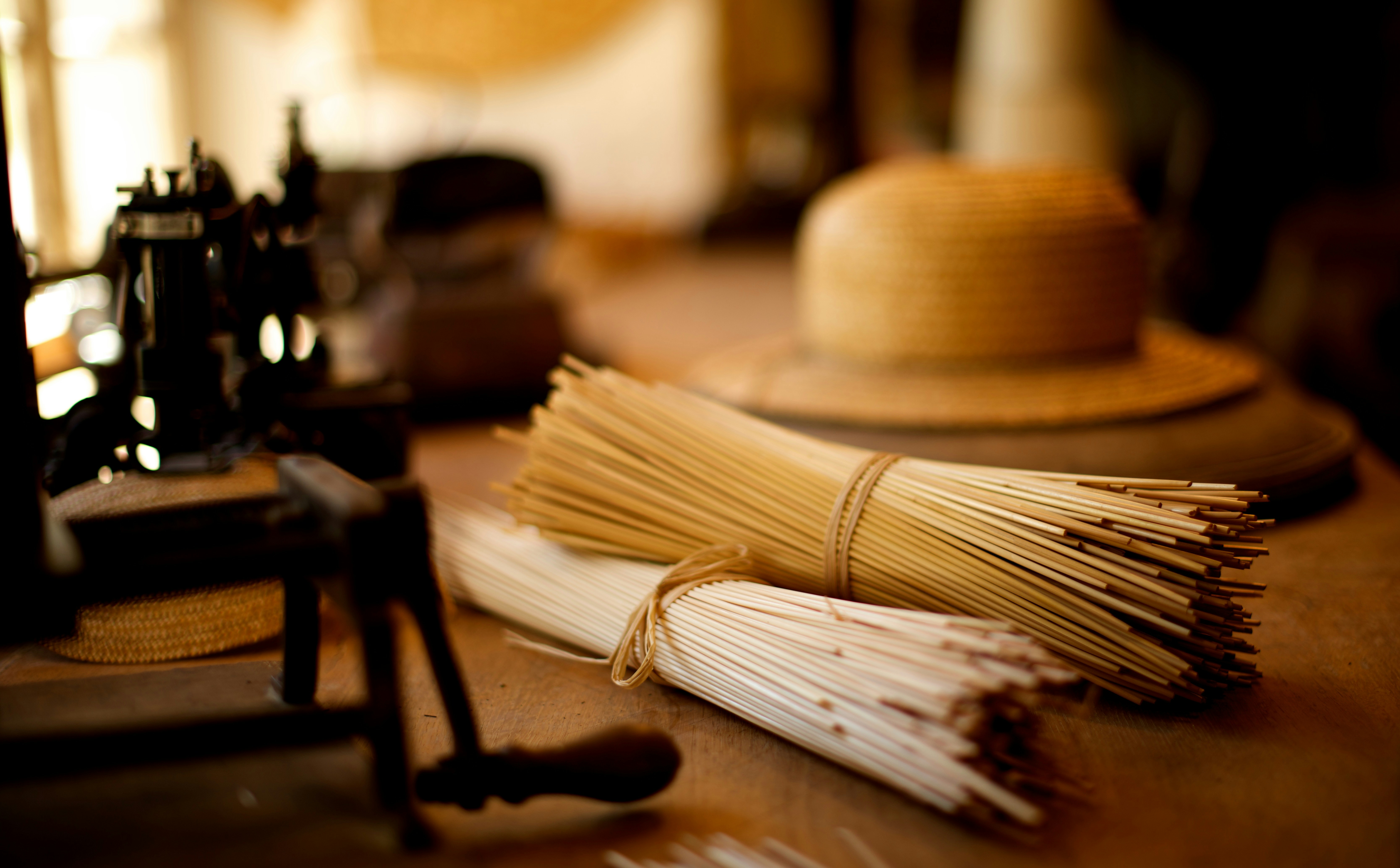 A wooden table topped with a hat and a brush photo – Free Ballenberg ...