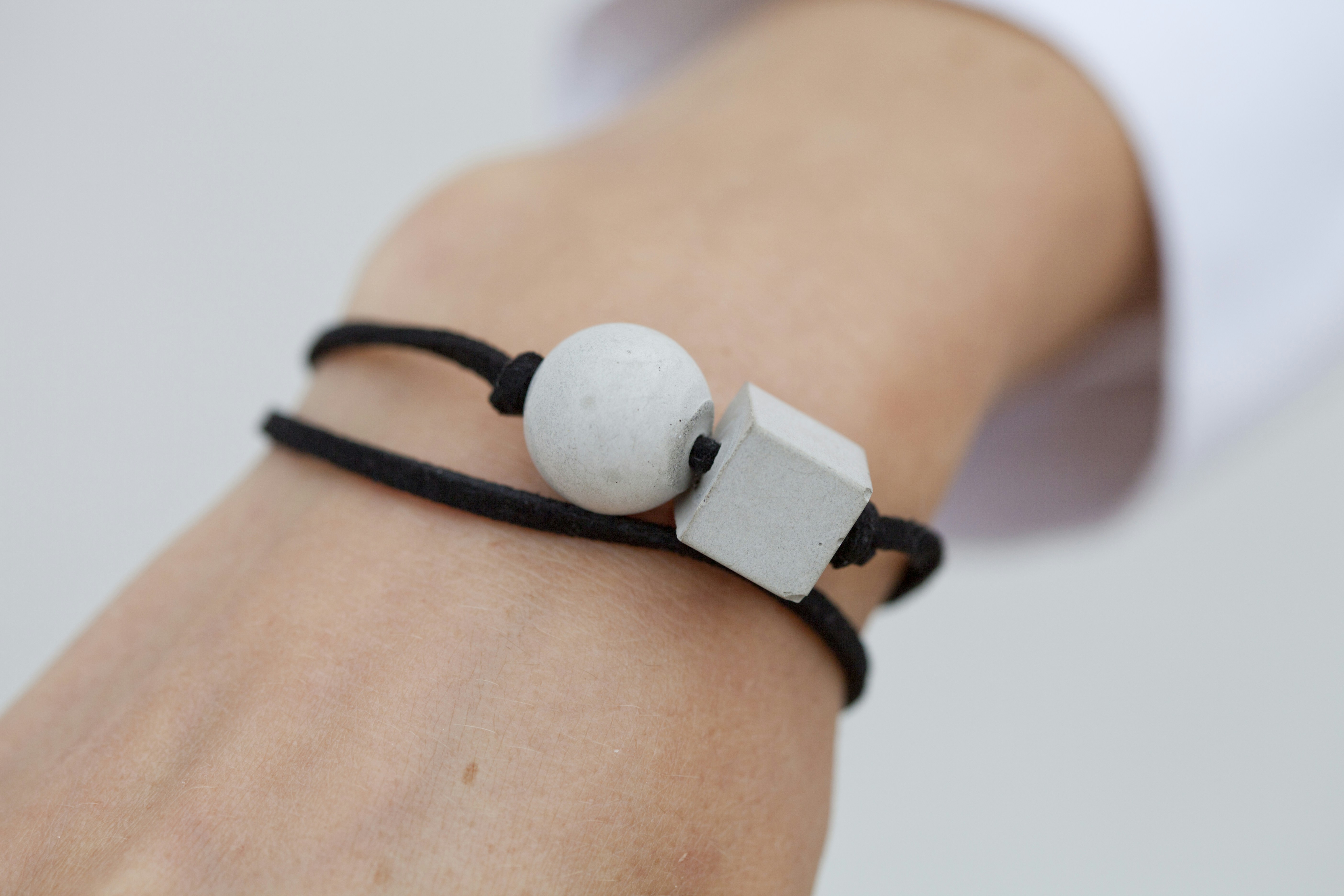 Minimalist Bracelet Duo on a Pale Wrist