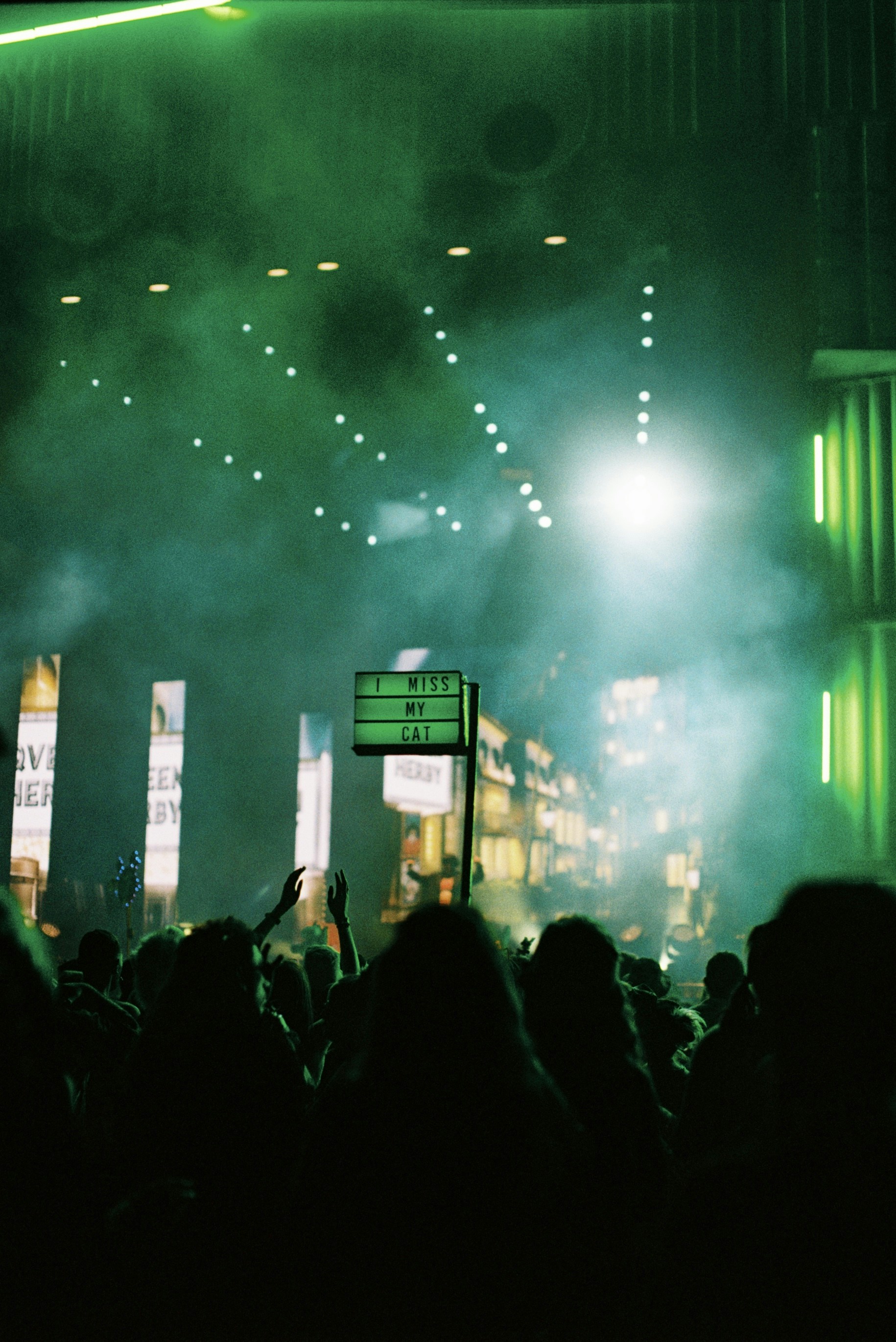 A crowd of people standing in front of a stage photo – Free Wallpaper ...