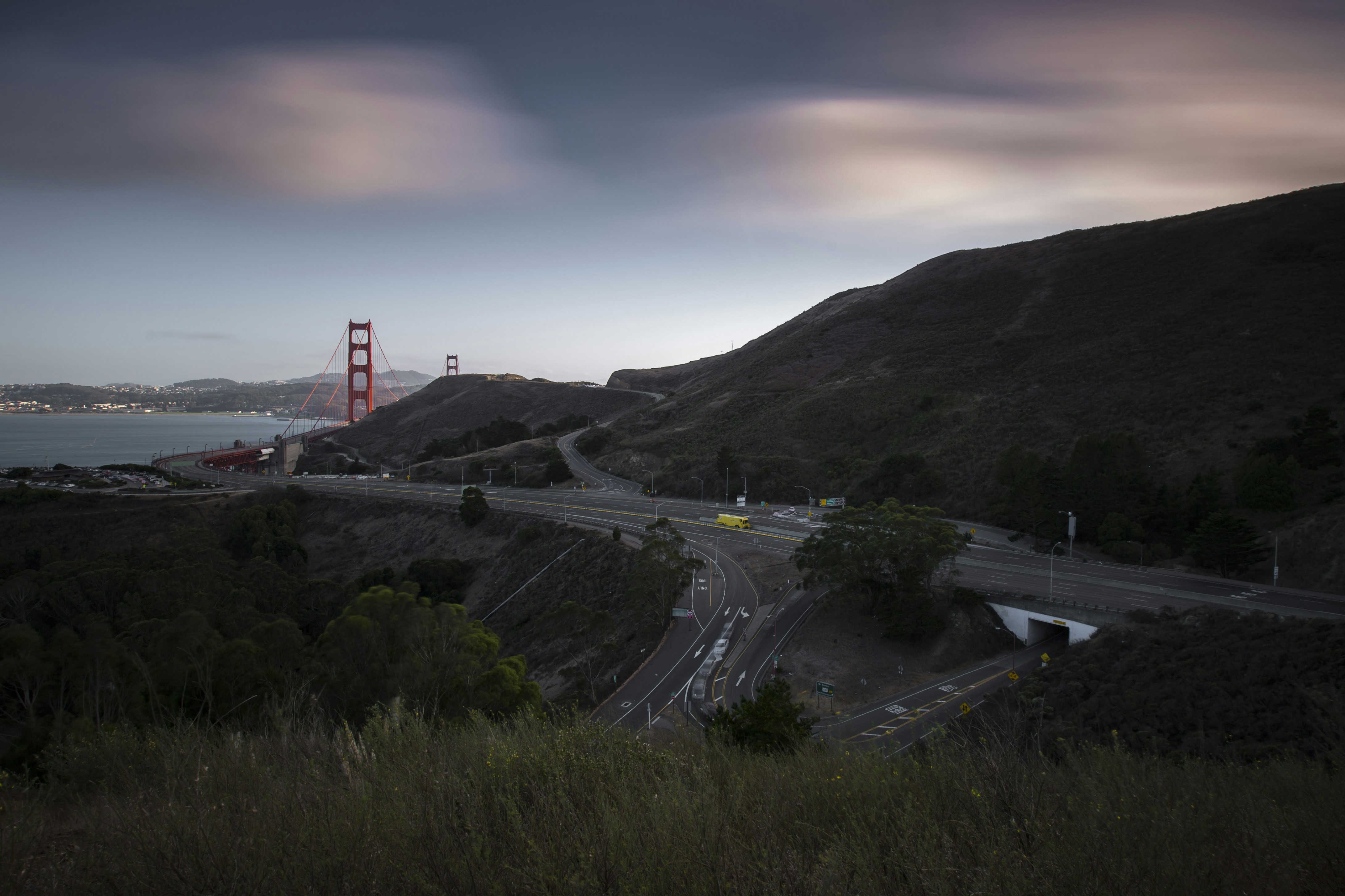 Winding Road Toward the Golden Gate at Dusk