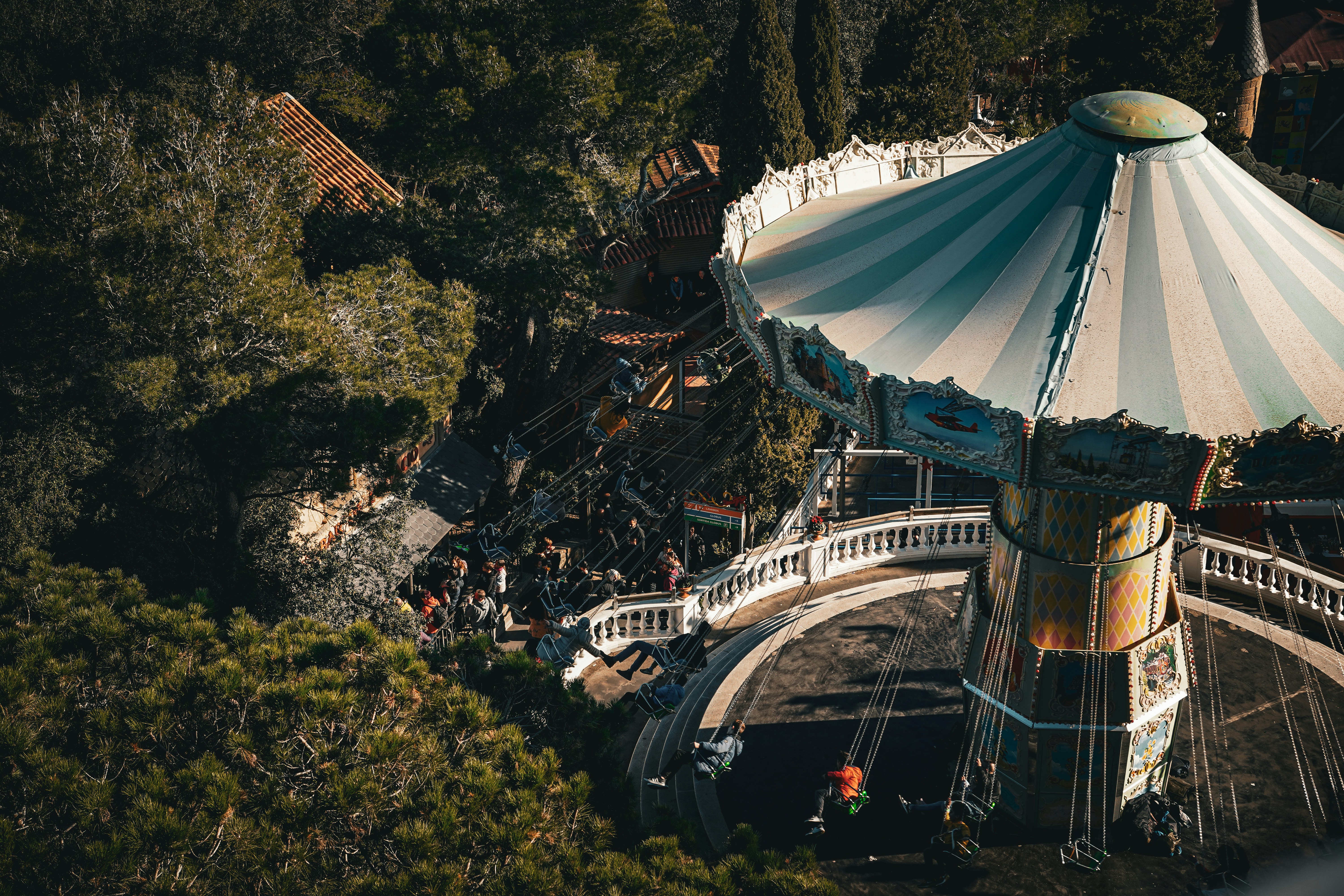 An aerial view of a carousel in a park photo – Free Urban Image on Unsplash