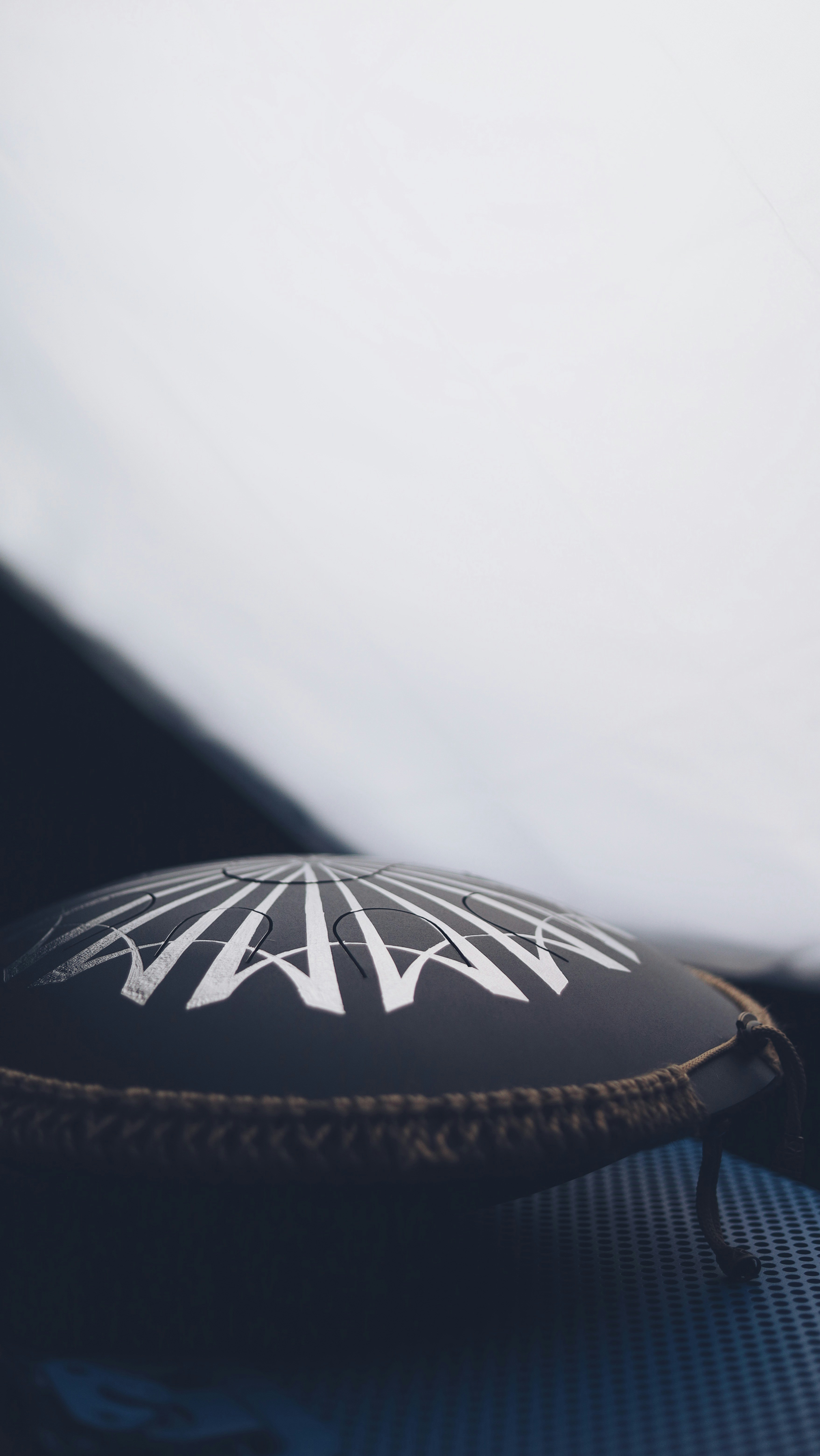 Harmonic Resonance: A Steel Tongue Drum in Contemplative Light