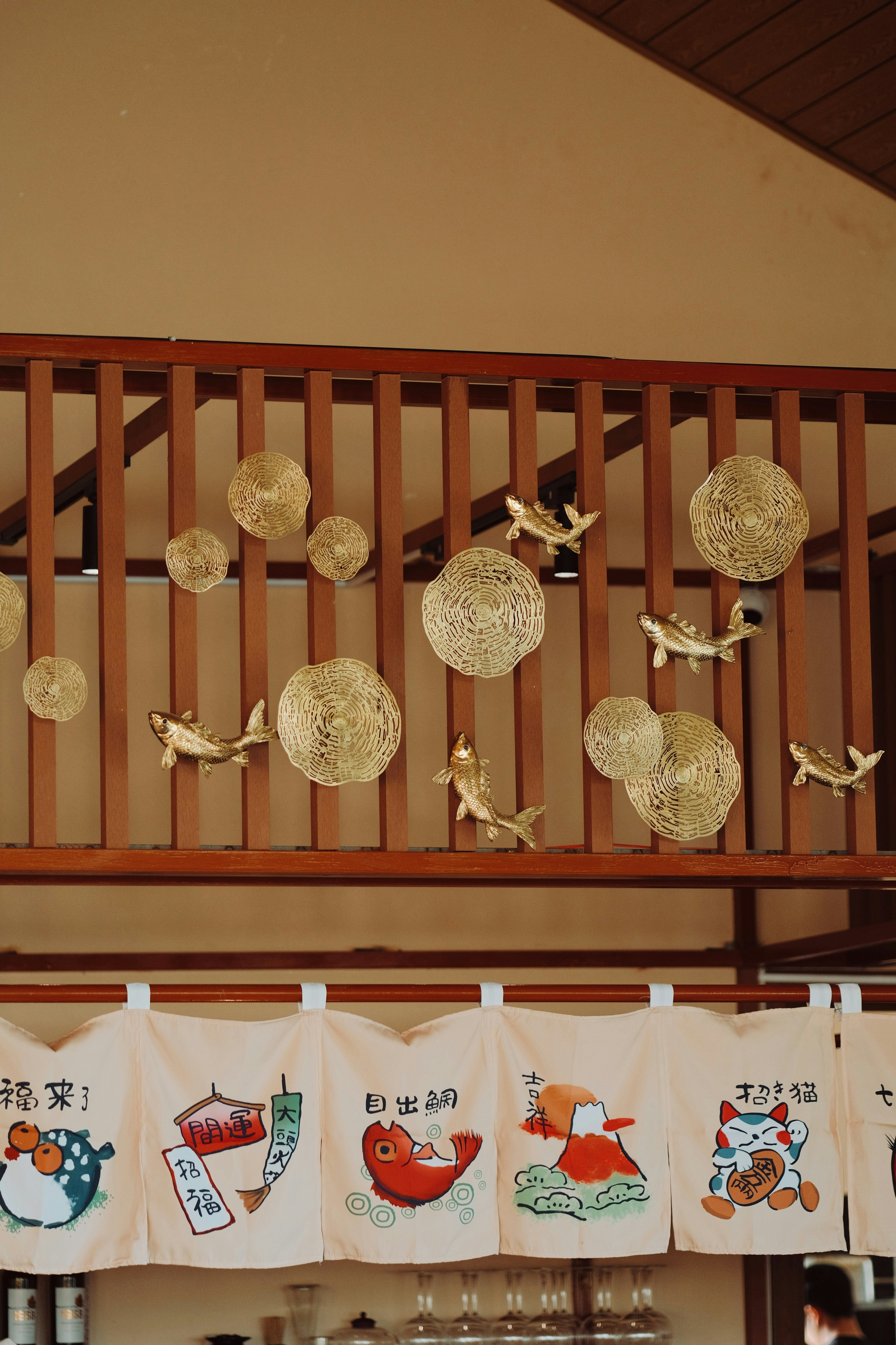 Woven Orbs Hover Above a Bannered Balcony