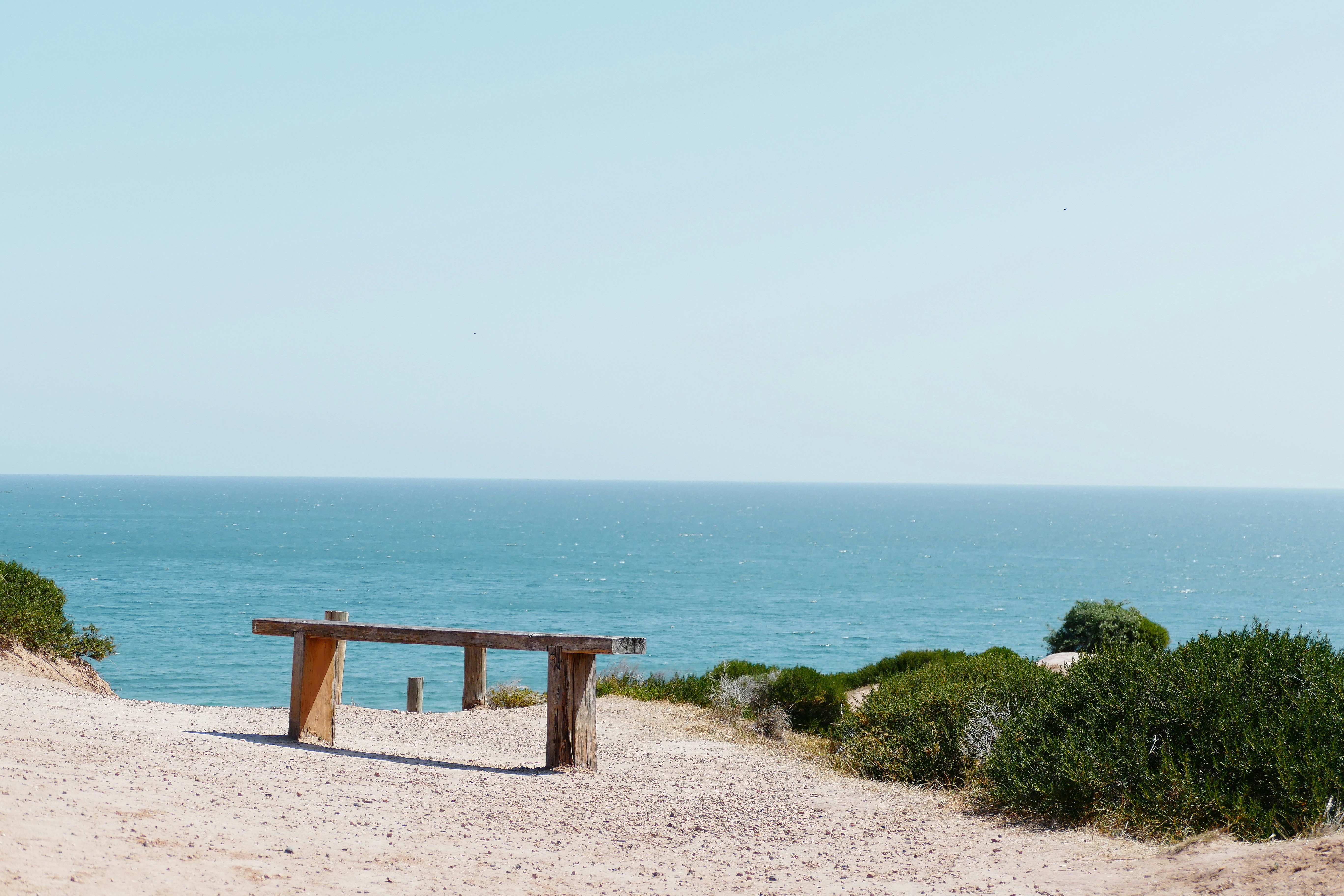 Dune-Side Bench: A Quiet Frame at the Sea's Edge