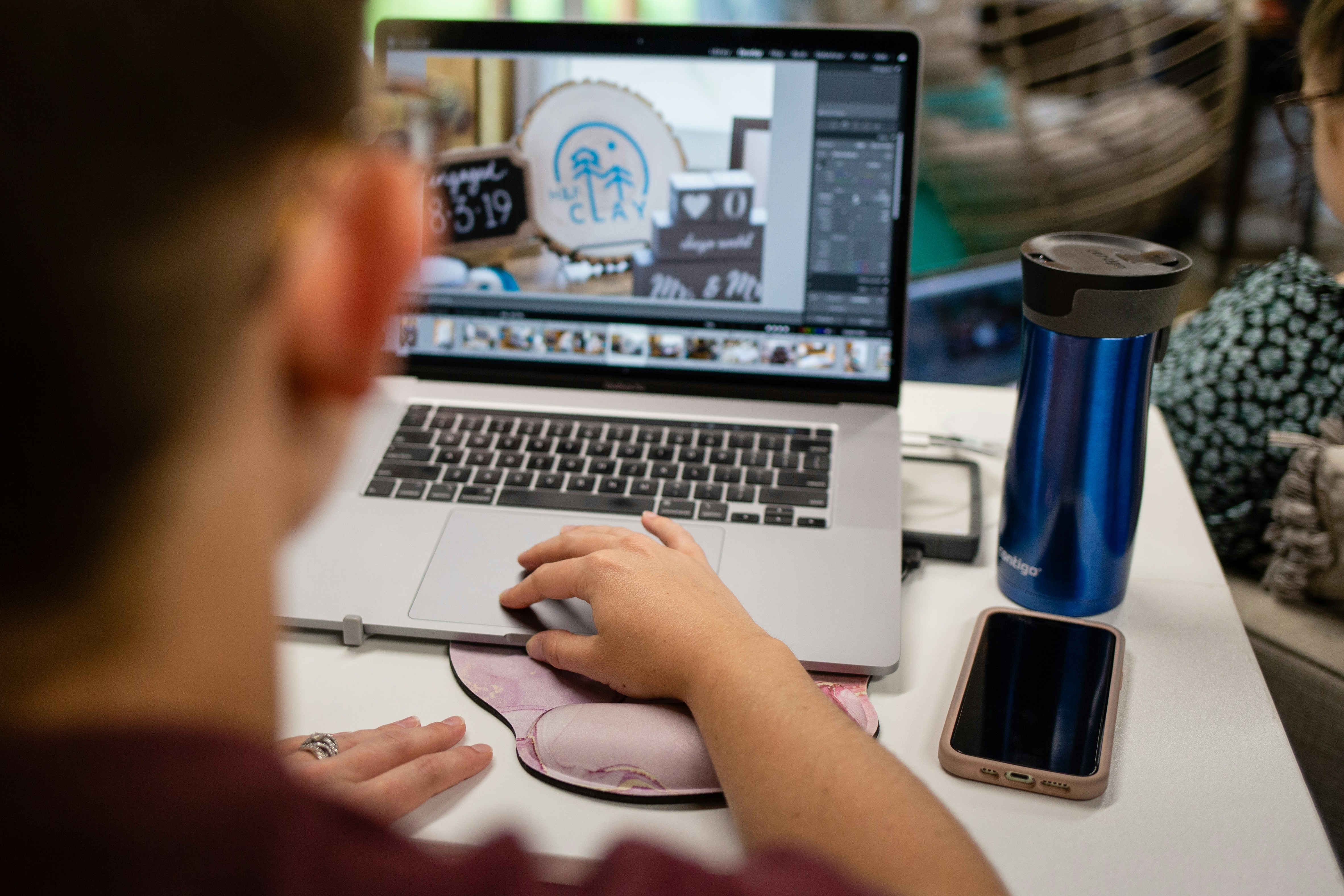 A man sitting in front of a laptop computer photo – Free Office Image ...