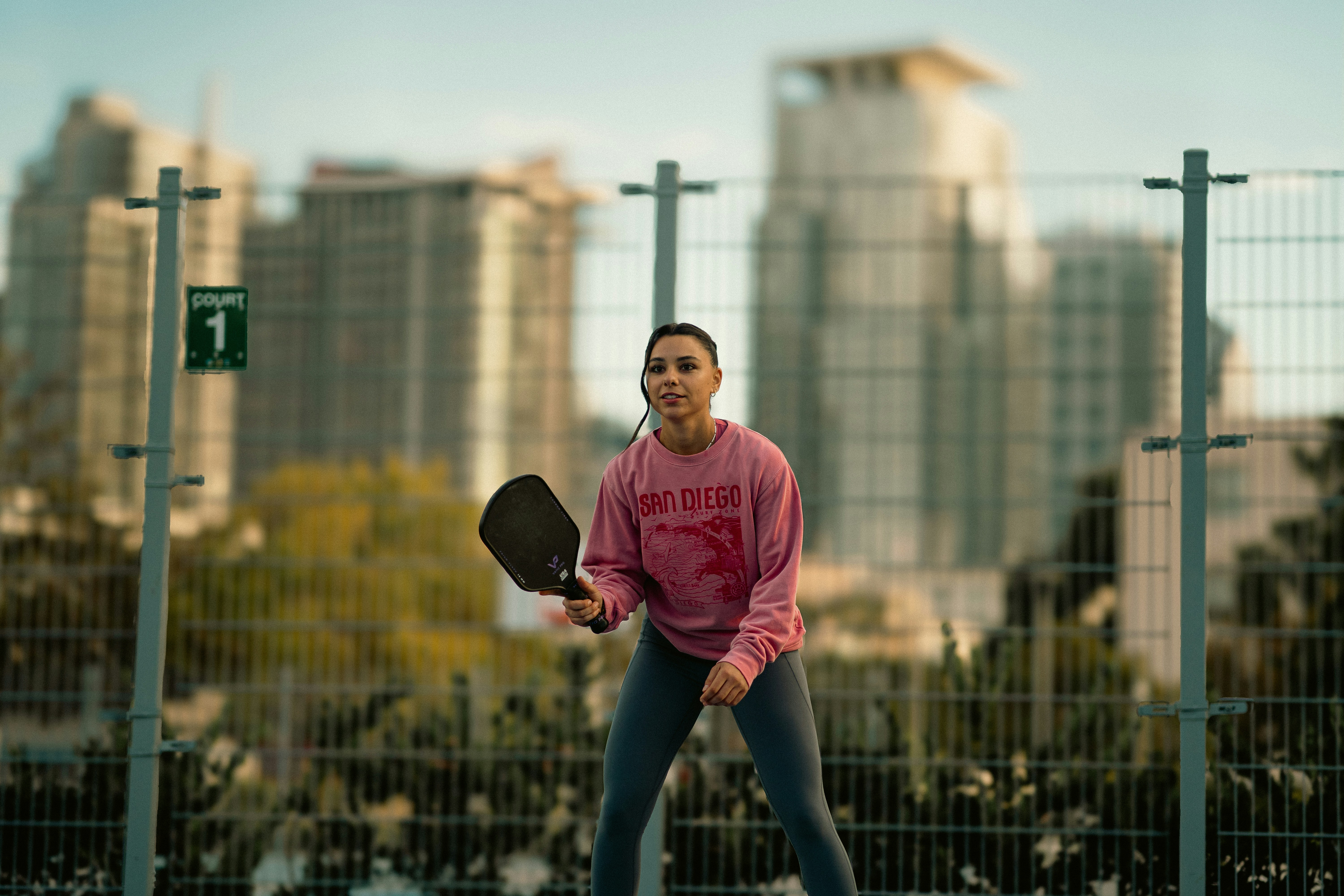 Urban Paddle: Focused Stance Before the Rally