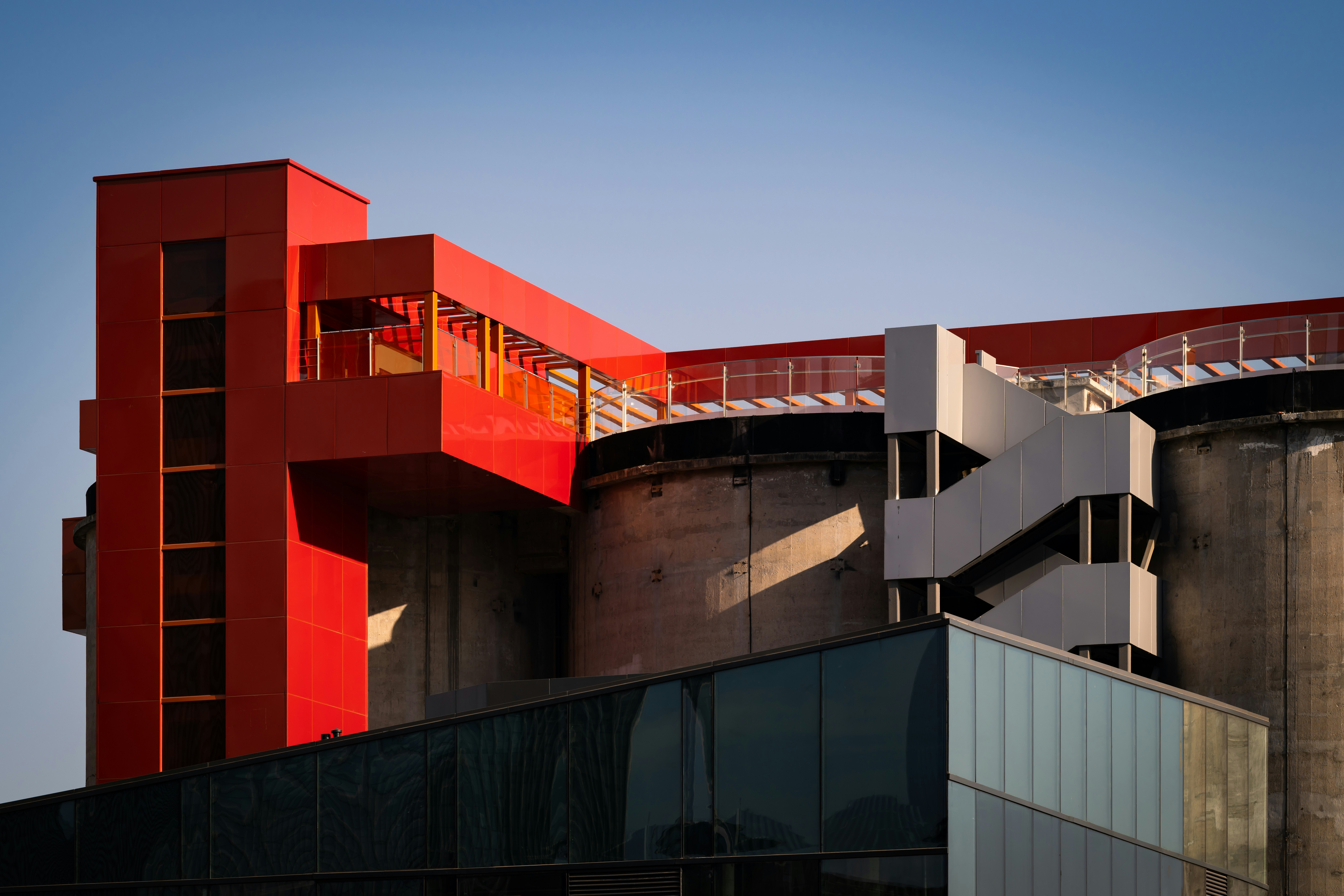A red and grey building with a red balcony photo – Free Xuhui district ...