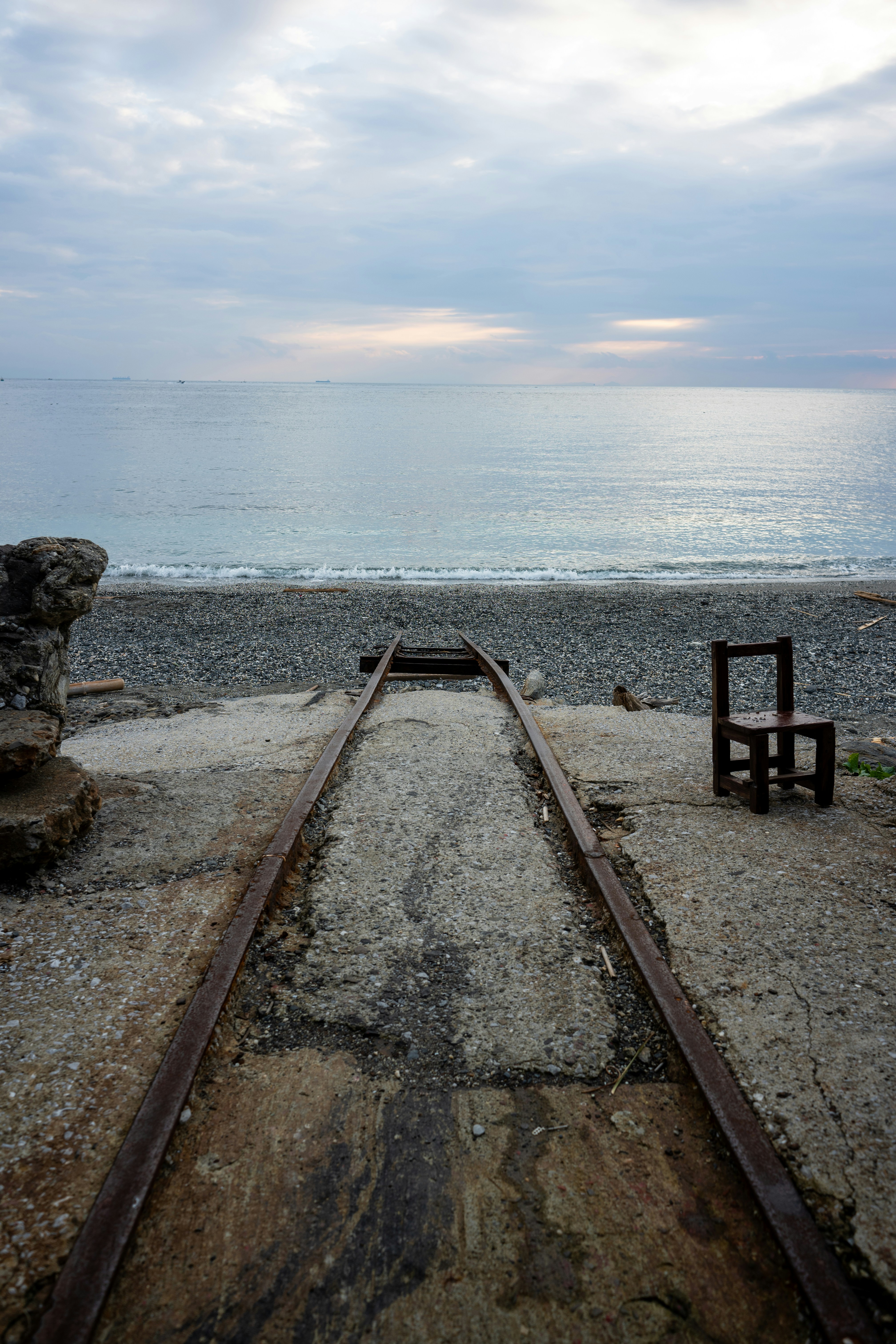 A train track on a beach near the ocean photo – Free Beach Image on ...