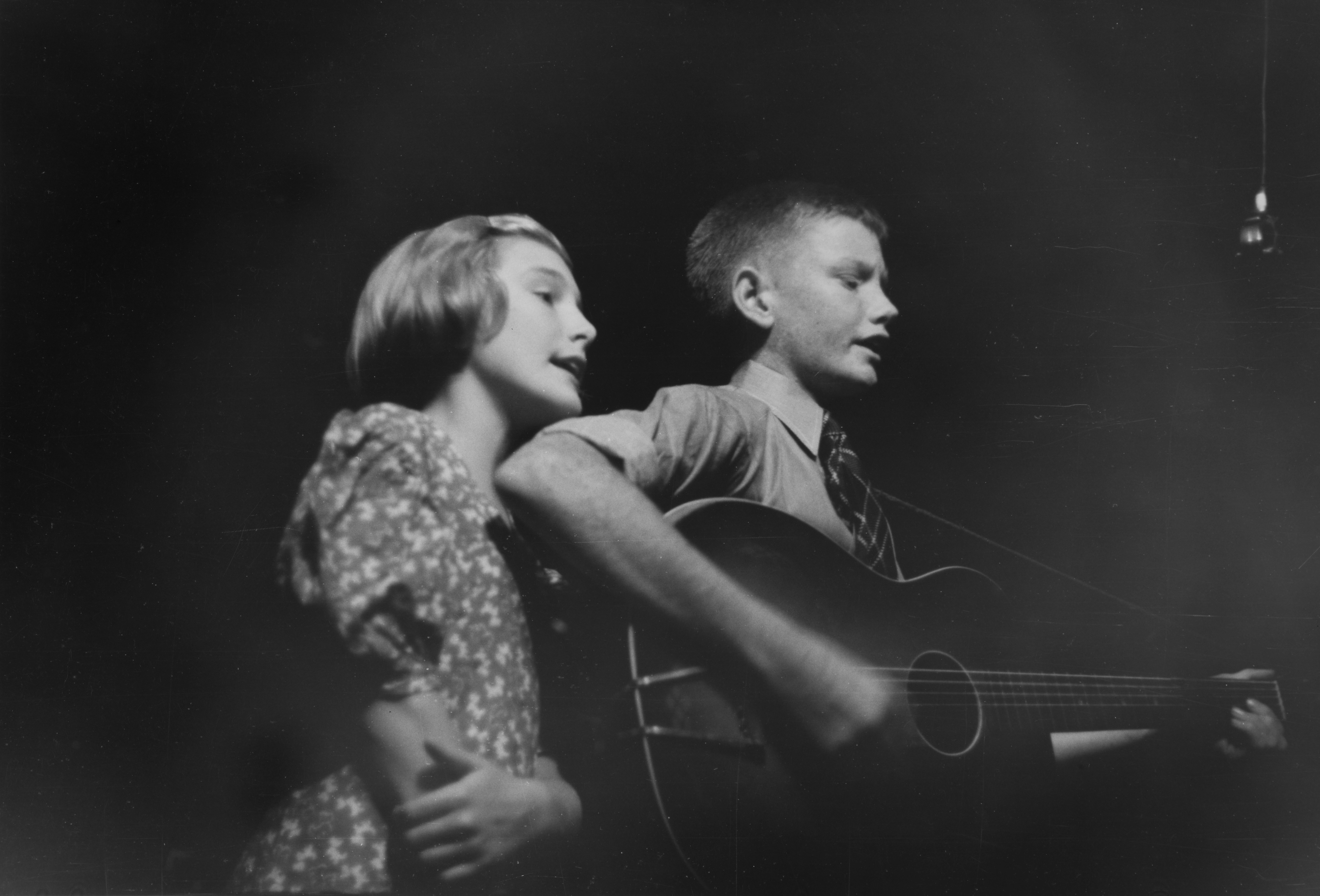 The Miriam and Ira D. Wallach Division of Art, Prints and Photographs: Photography Collection, The New York Public Library. "Child musicians at Asheville, North Carolina" The New York Public Library Digital Collections. 1937. https://digitalcollections.nypl.org/items/edd339c0-00a4-0133-2574-58d385a7bbd0