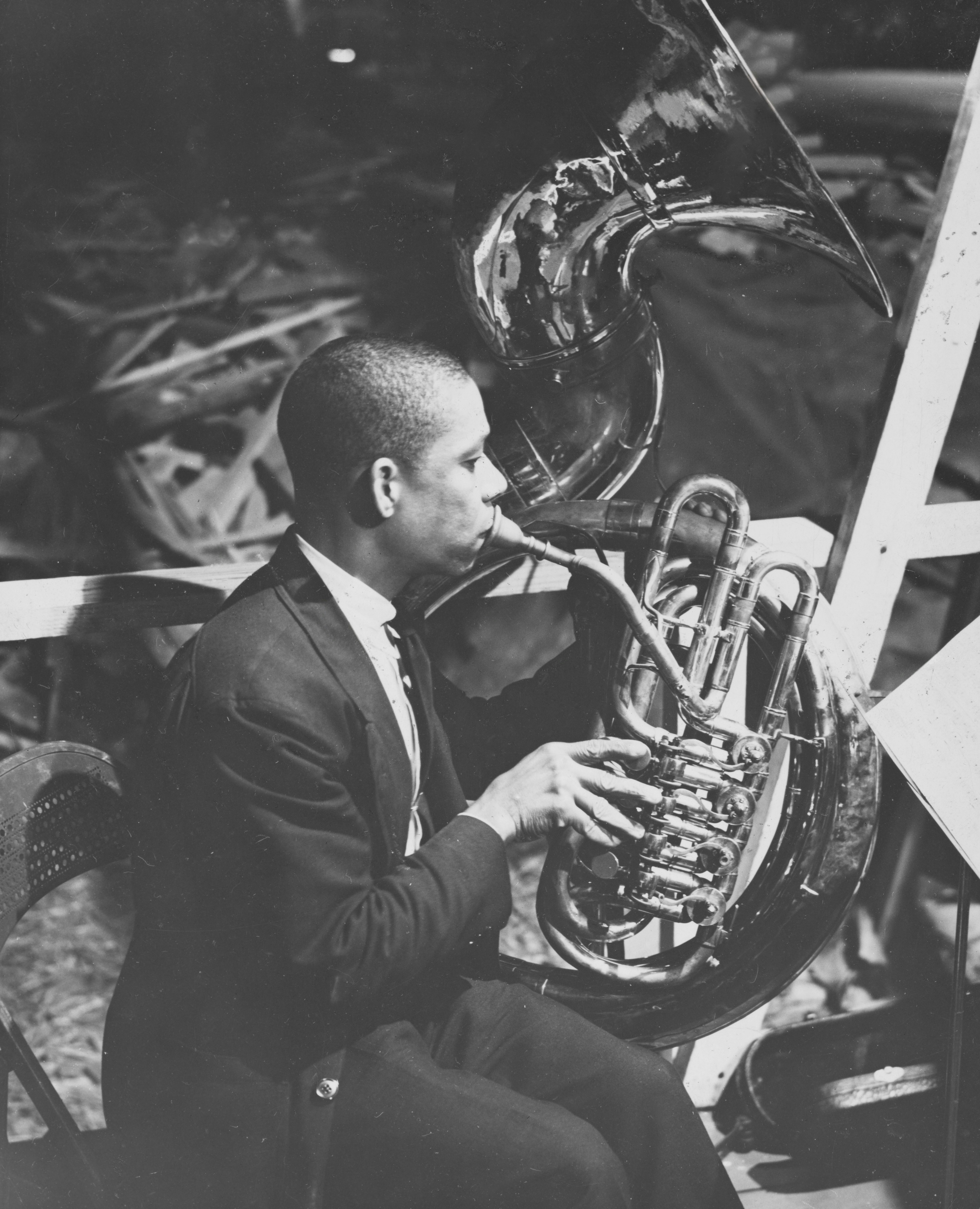 Schomburg Center for Research in Black Culture, Photographs and Prints Division, The New York Public Library. "Sousaphone player" The New York Public Library Digital Collections. 1935 - 1943. https://digitalcollections.nypl.org/items/dd3fd470-3a52-0134-4fd3-00505686a51c