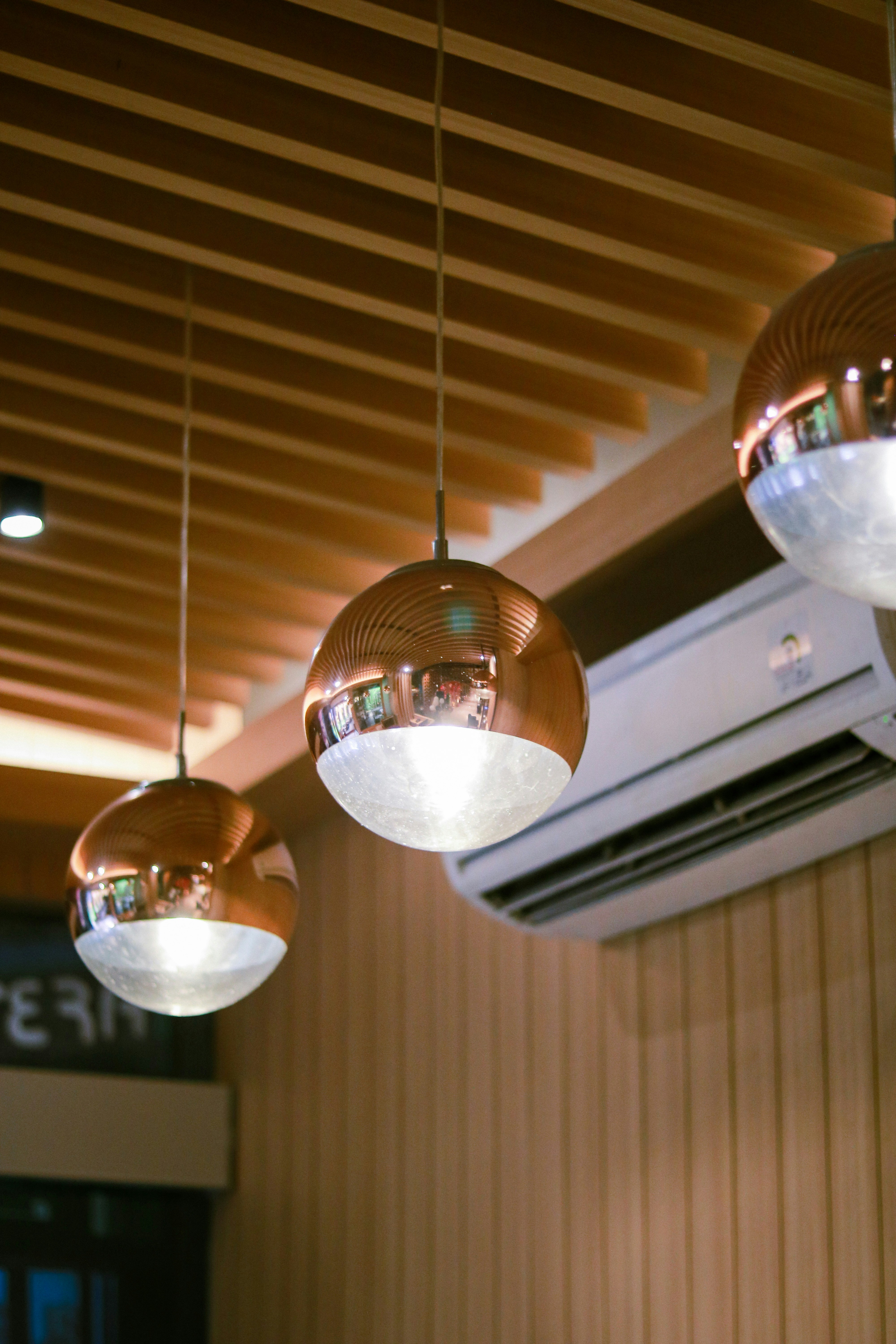 A group of lights hanging from a ceiling
