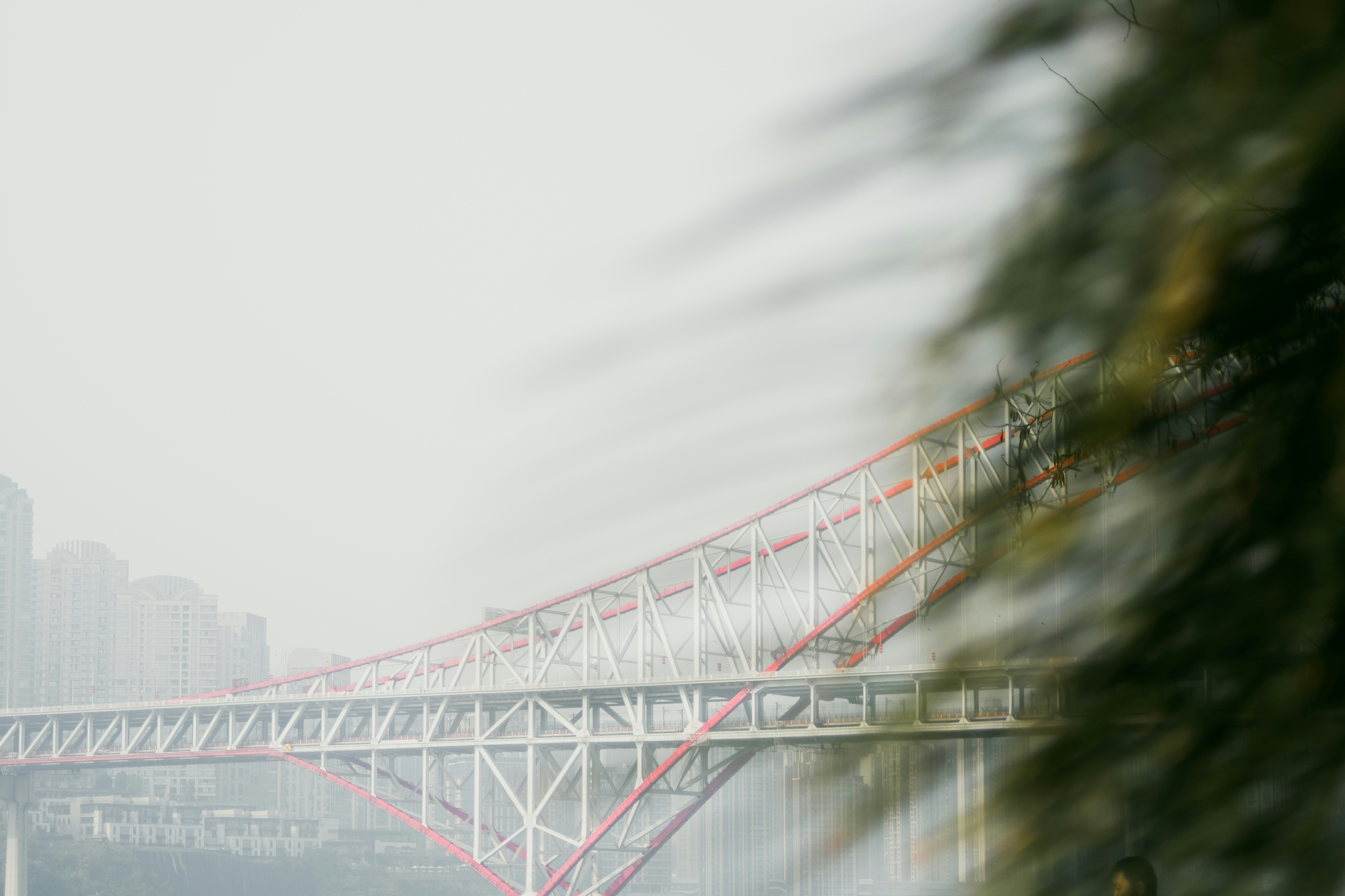 Urban Veil: Bridge in Hazy Metropolis