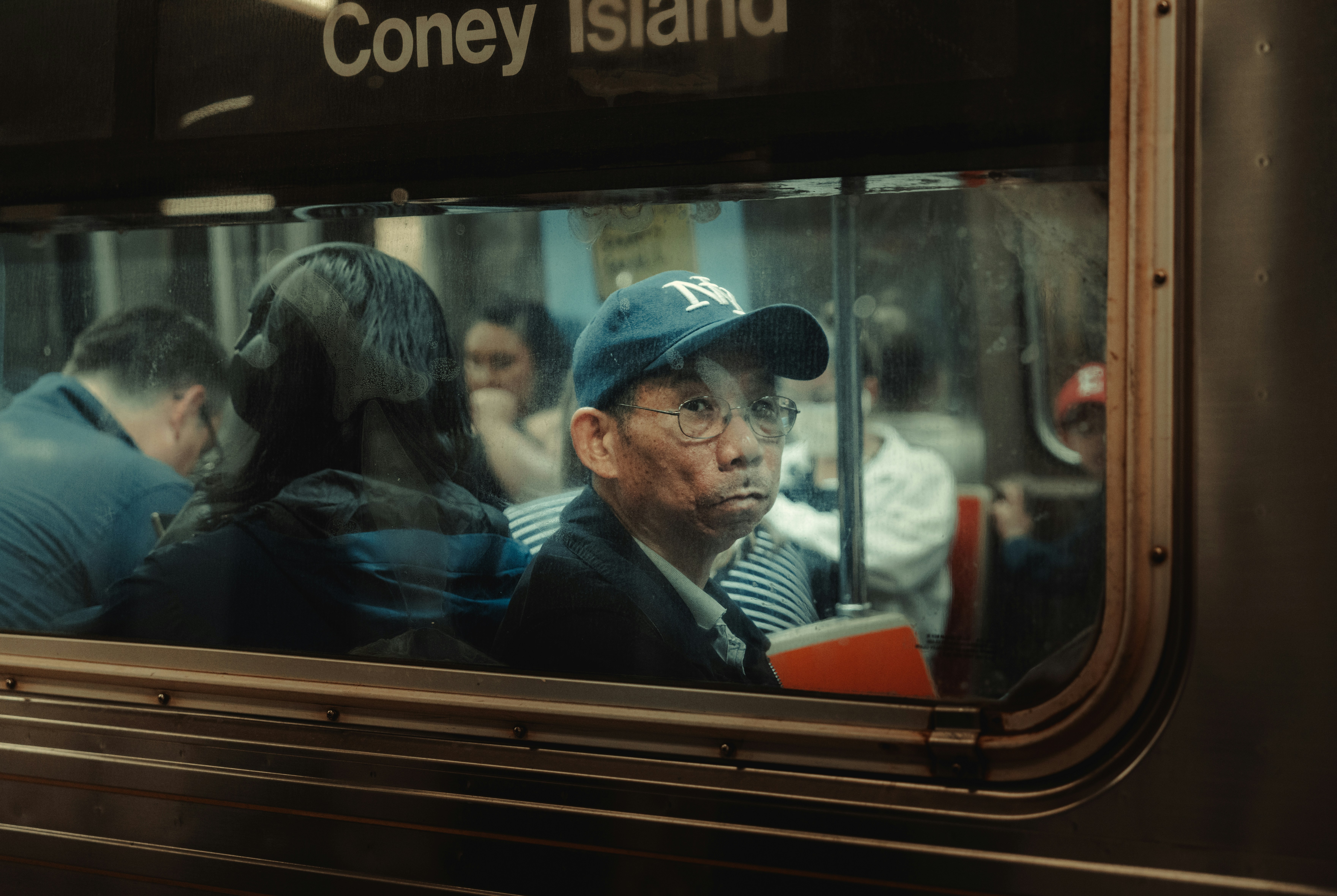 Eyes in Transit: Quiet Contemplation on a Subway Window