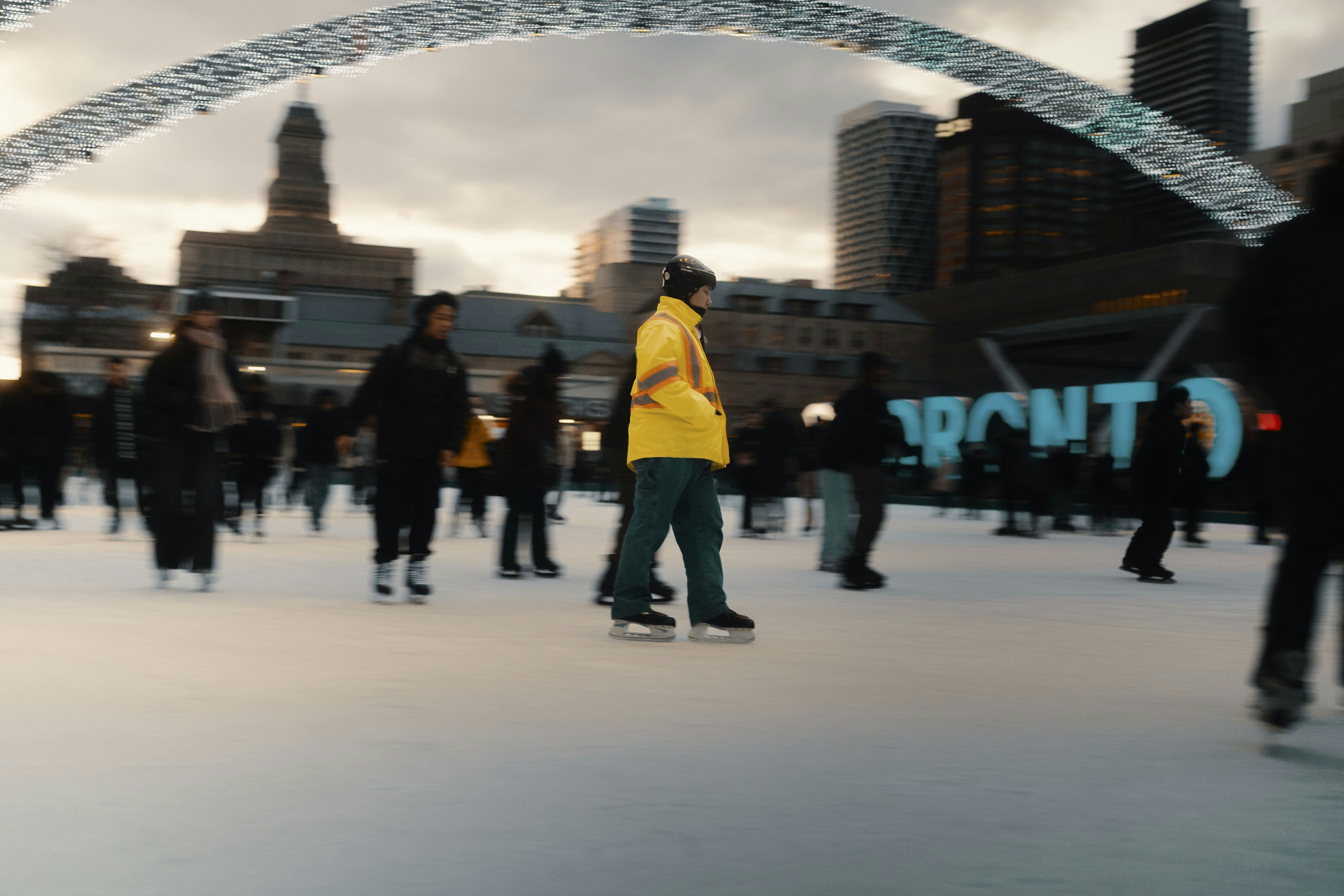 A group of people skating on an ice rink photo – Free Nathan phillips ...