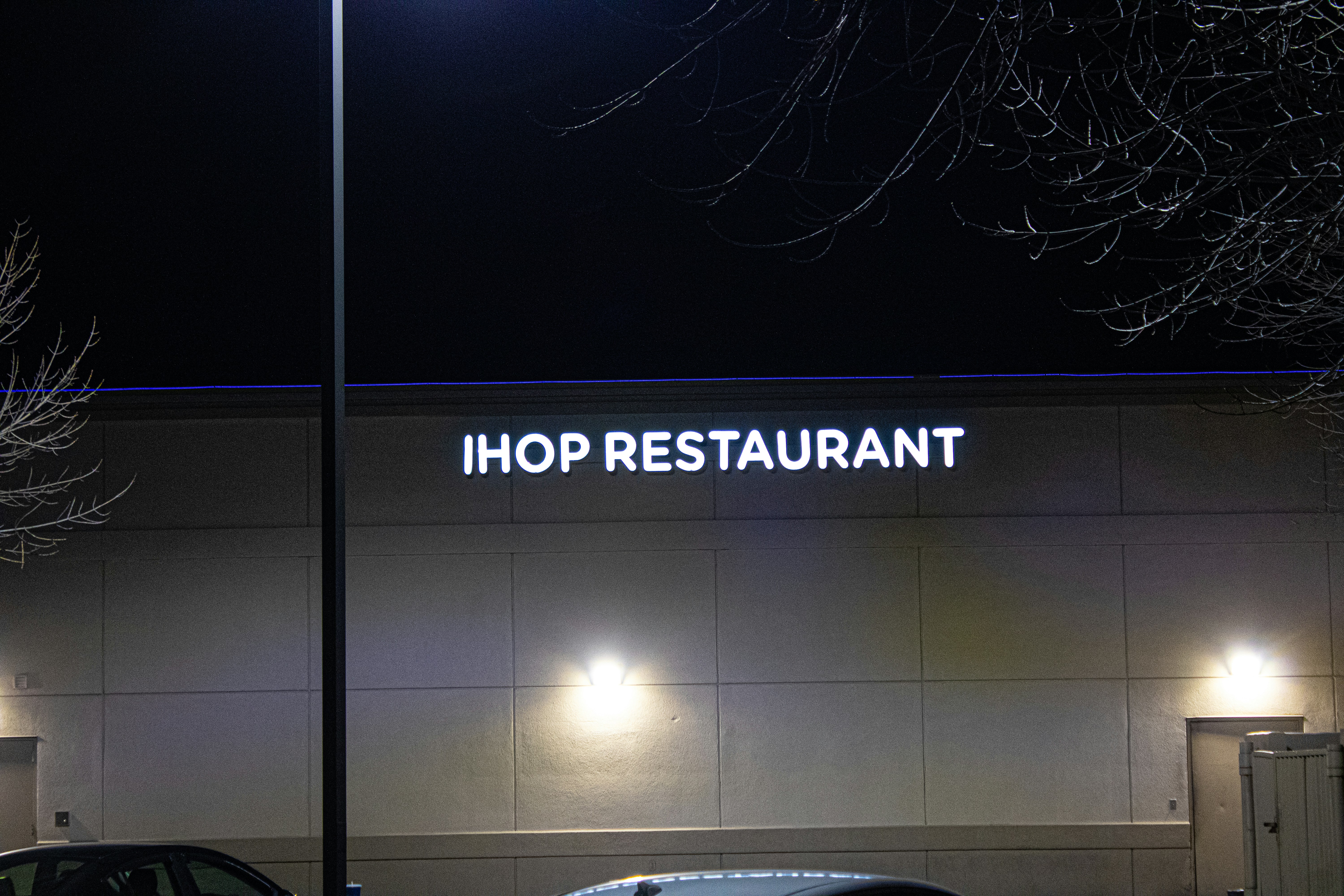 IHOP Neon Sign Over a Quiet Night Parking Lot
