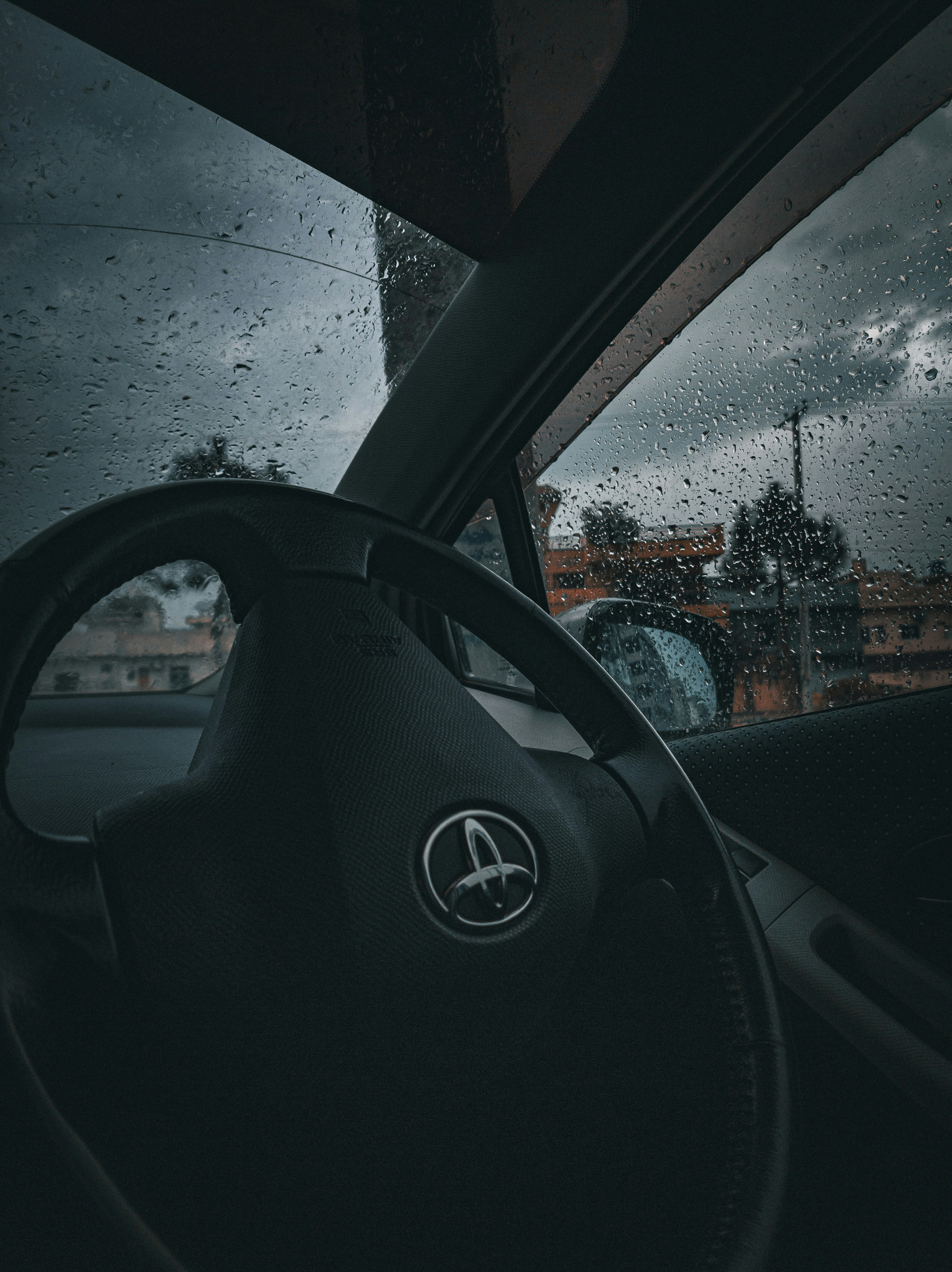 Raindrops and Reflections: A Drive Through Gloom