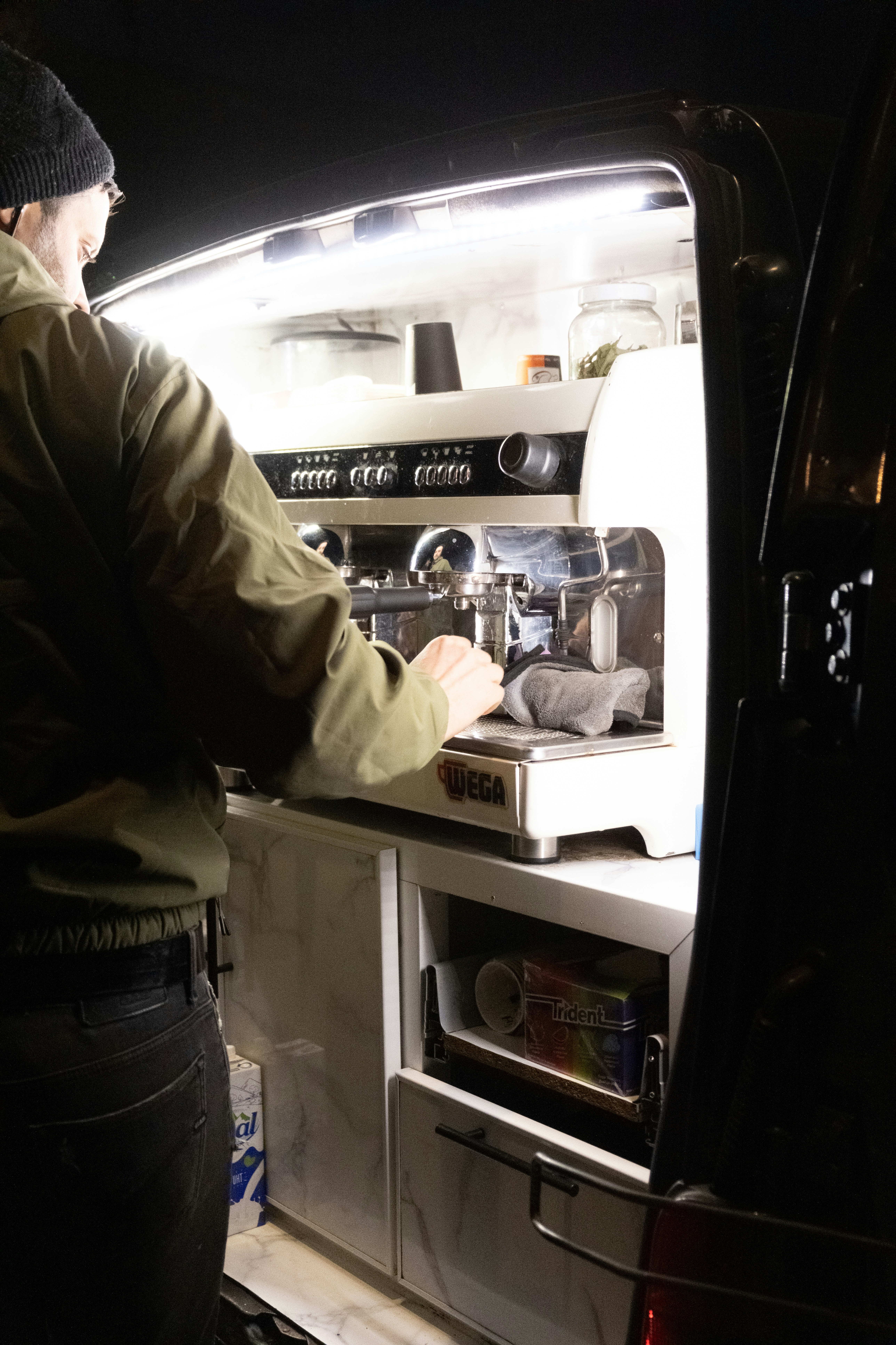 Midnight Shift at a Compact Espresso Rig Inside a Van Kitchen