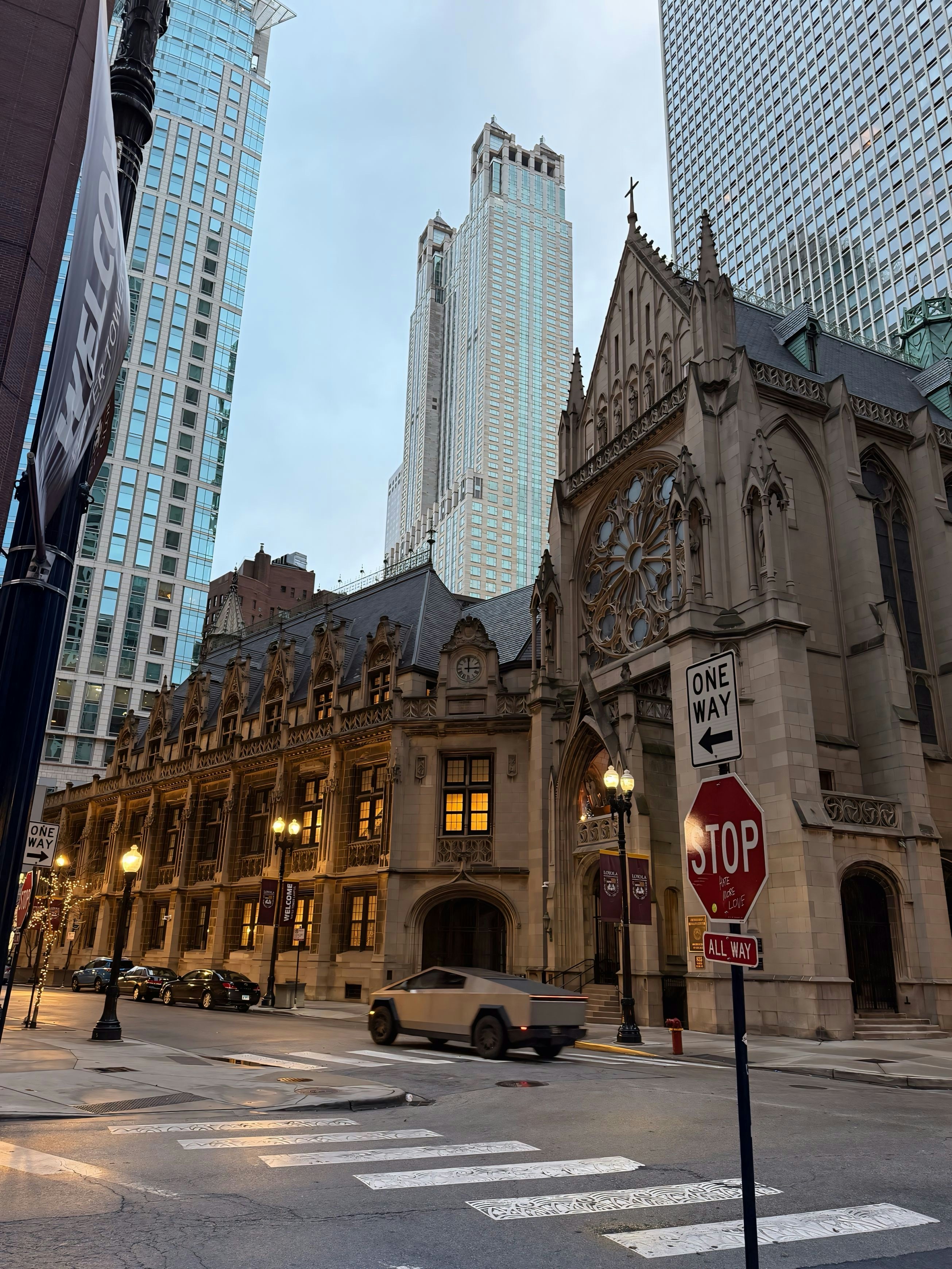 A stop sign in front of a large building photo – Free Usa Image on Unsplash