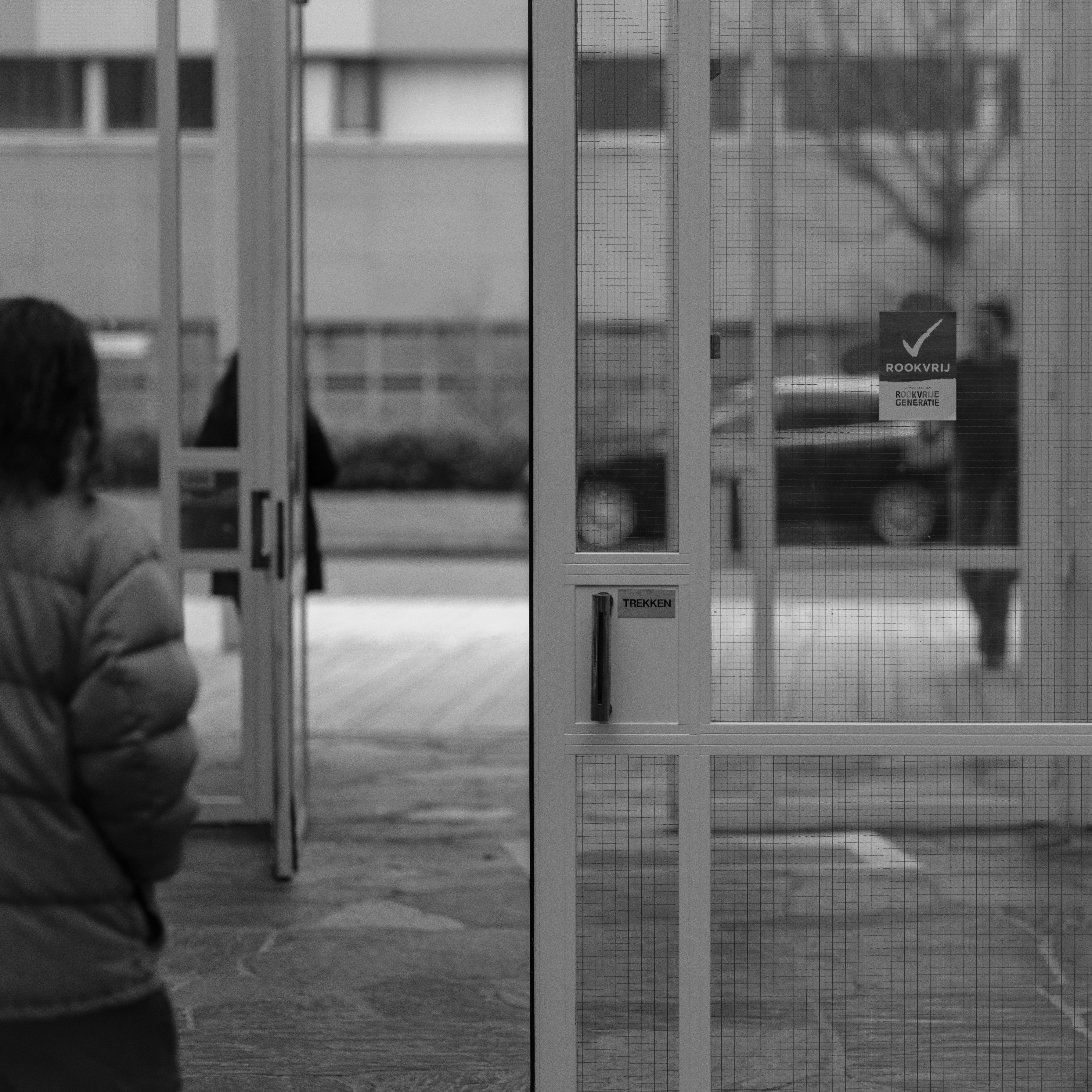 Threshold of Glass: Quiet Geometry and a Moving Figure