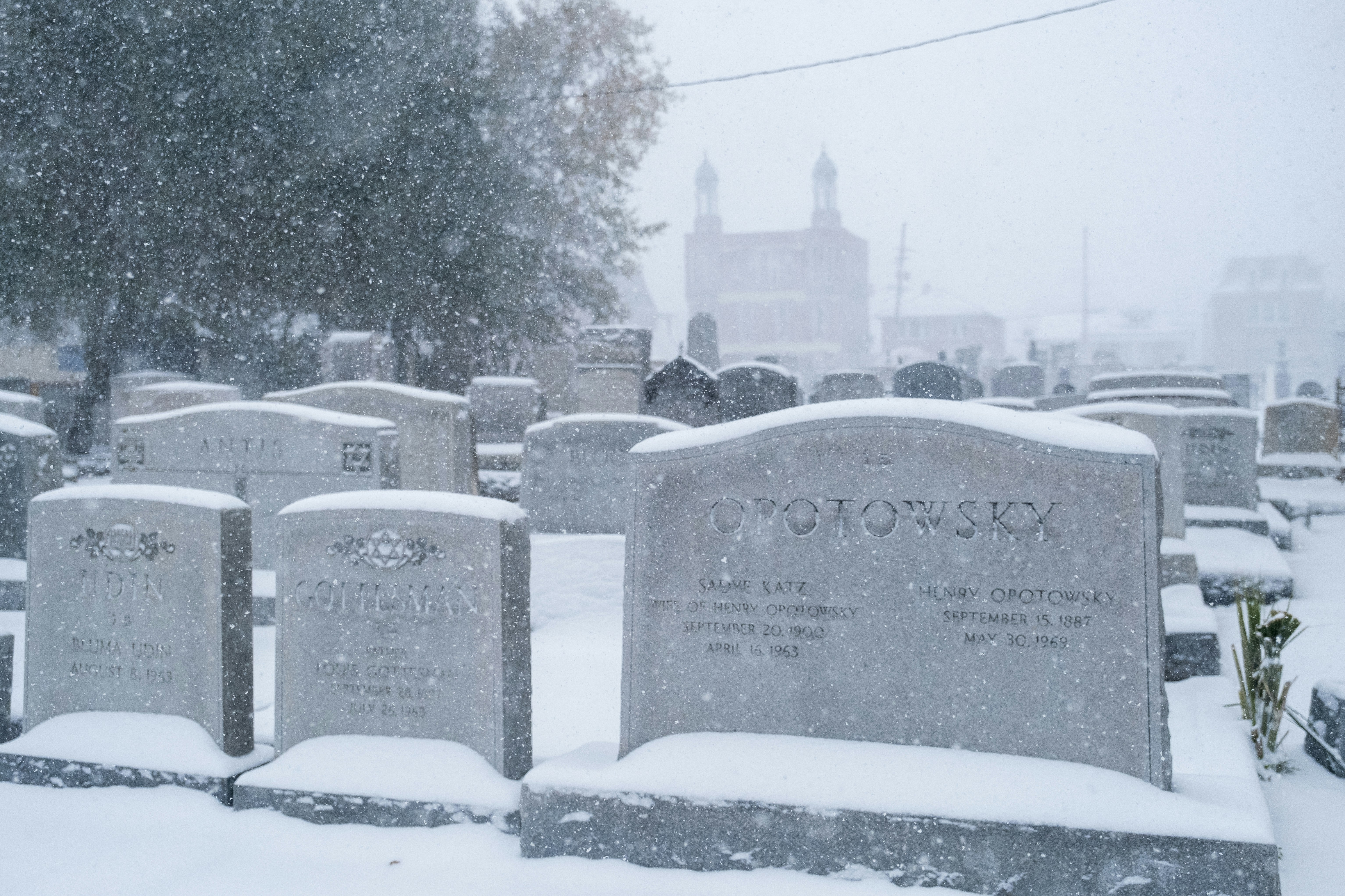 Snowbound Stones: Gravestones Under Winter's Quiet Veil