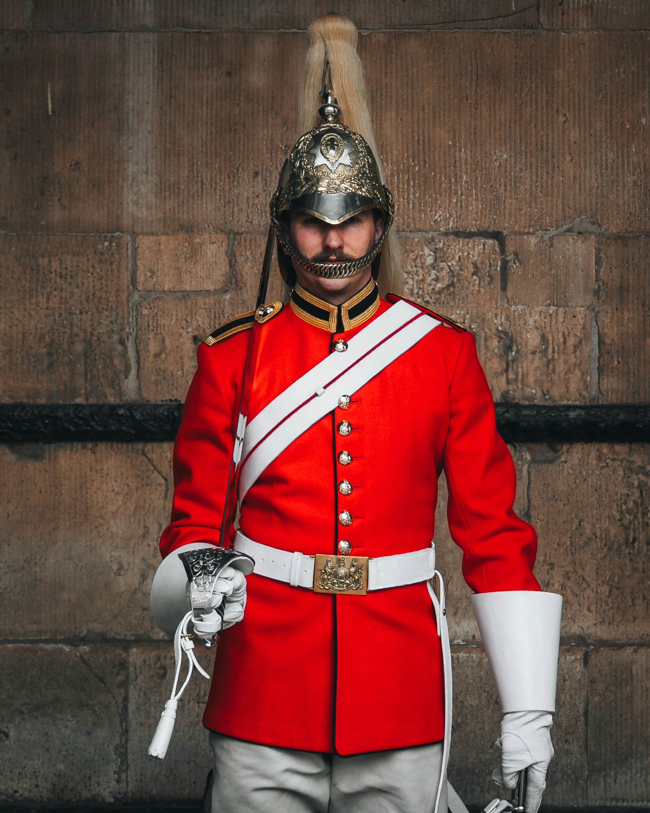 Red-Coat Sentinel: A Royal Guard in Full Dress