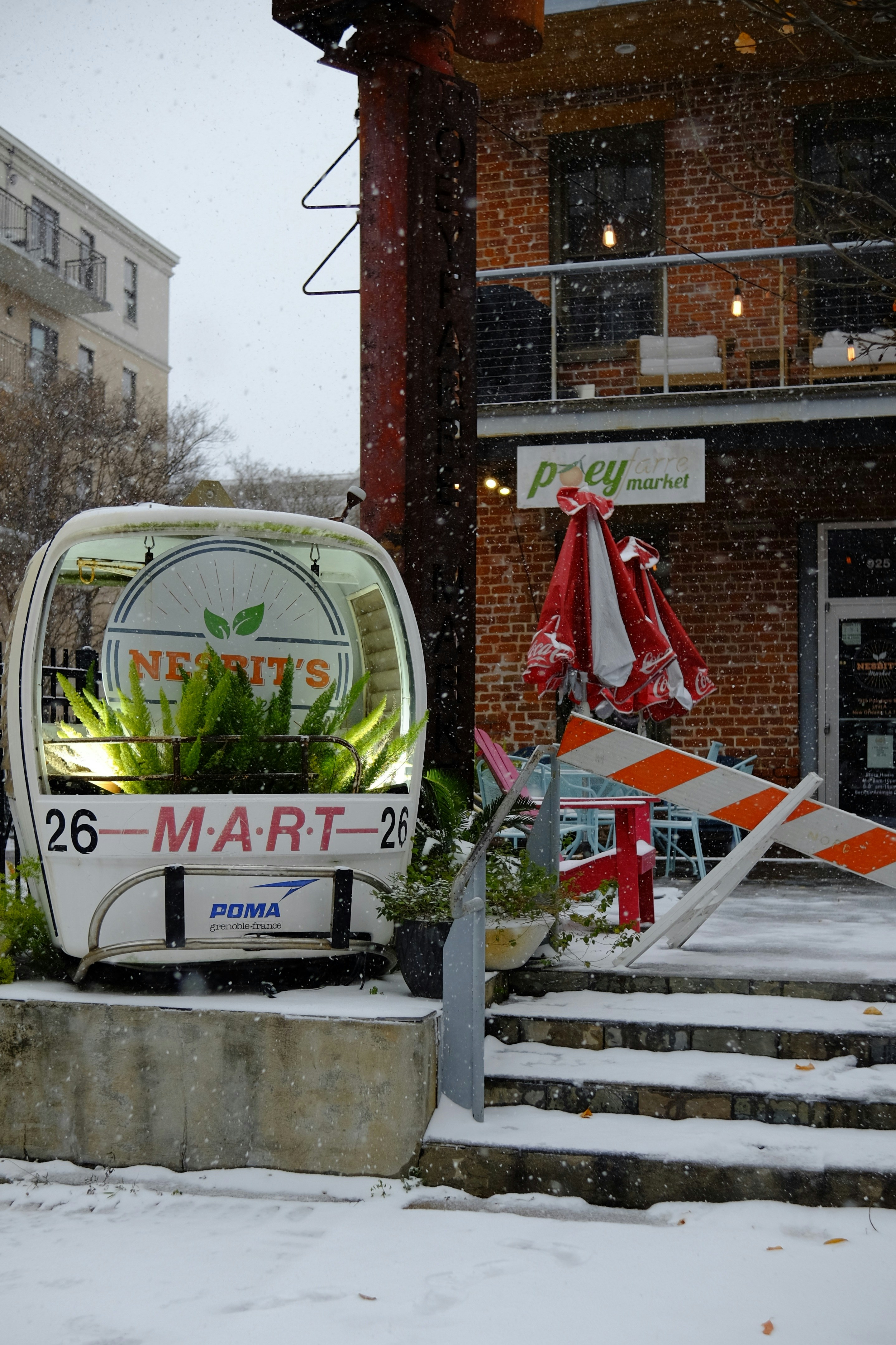 Snowy Streetfront Market Bus in Urban Winter Light