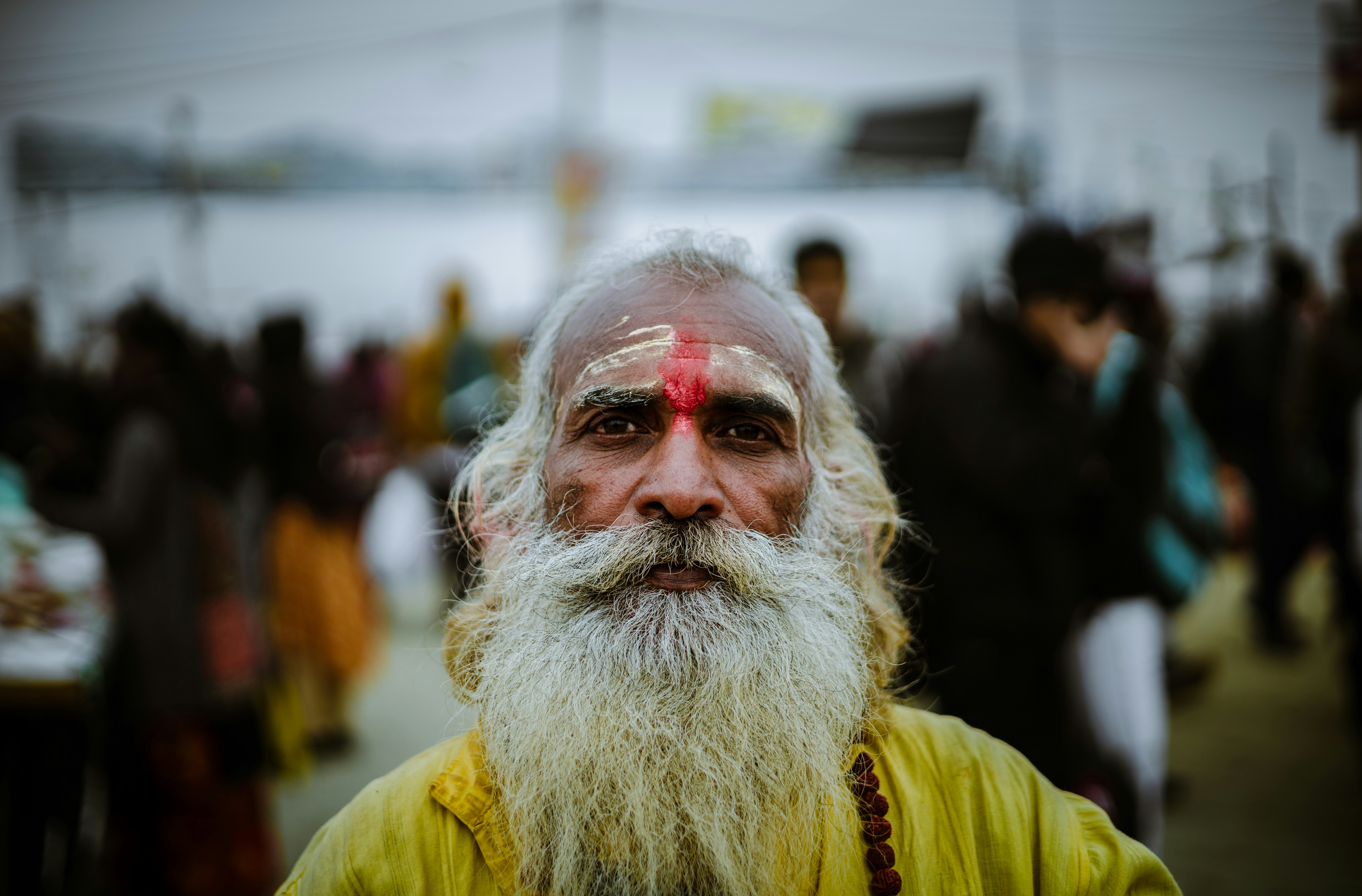 A man with a white beard and a red forehead photo – Free Woman Image on ...