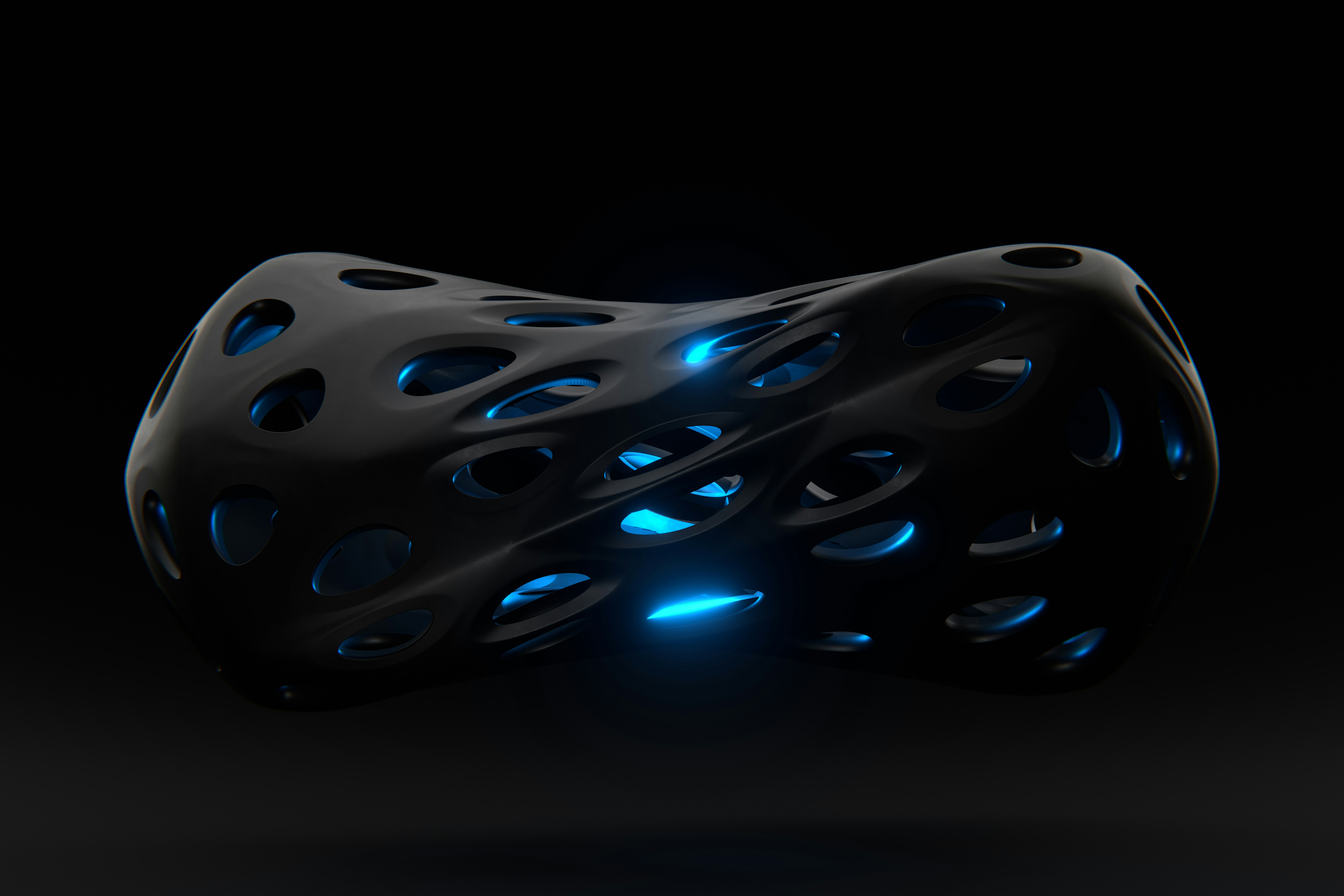 A black object with blue lights on it photo – Free Abstract Image on ...