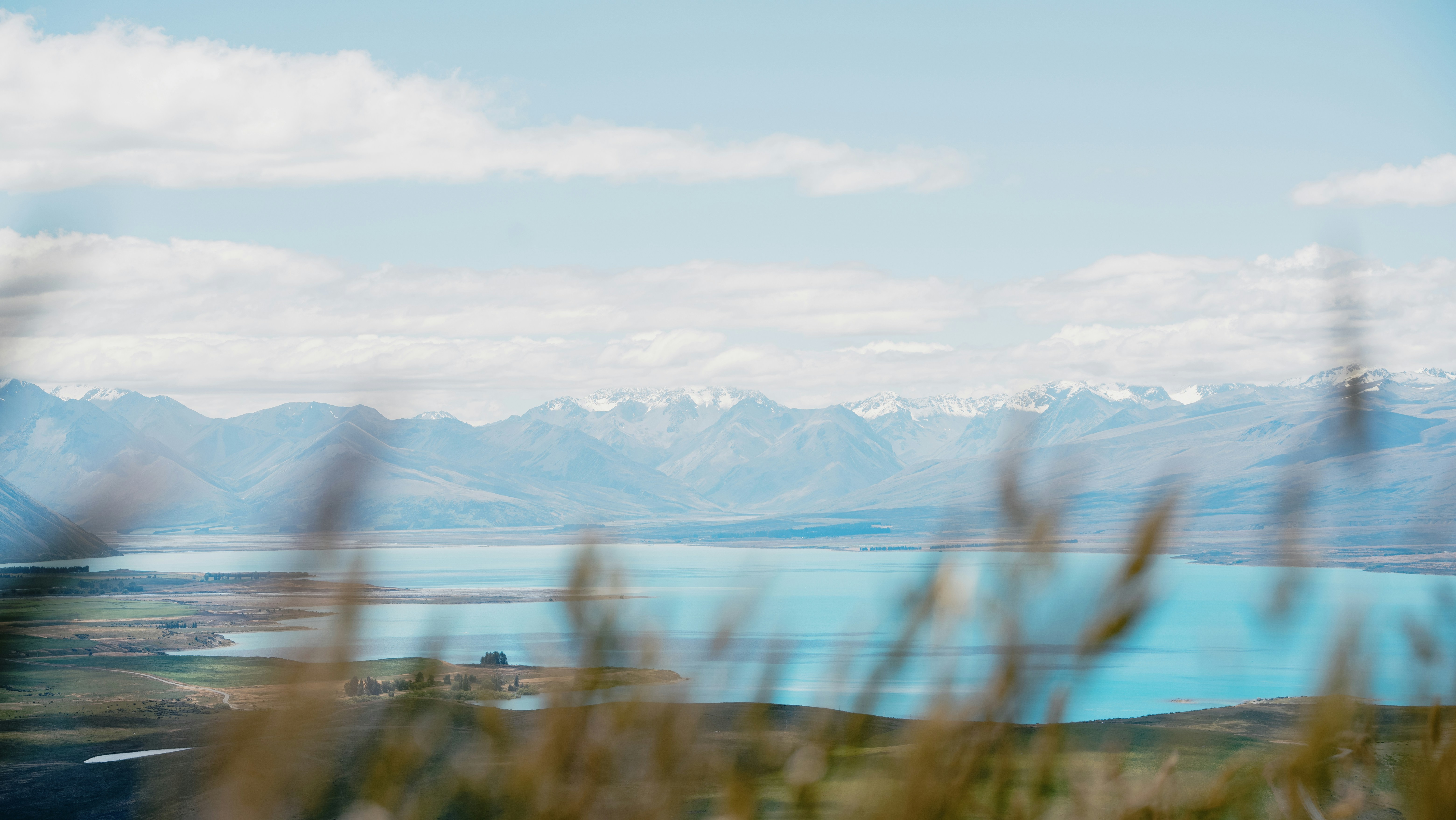 A blurry photo of a lake and mountains photo – Free Lake tekapo Image ...