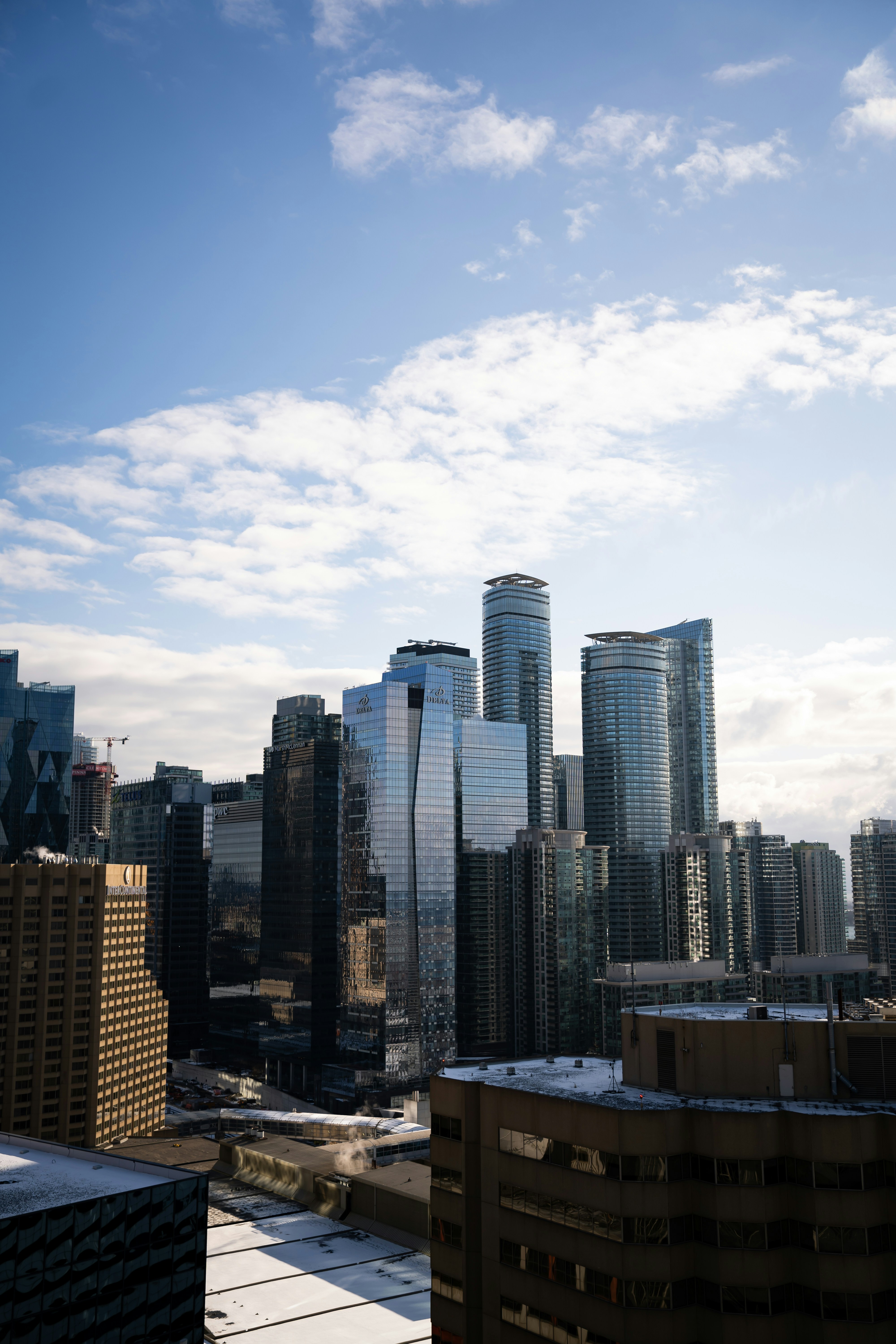 A view of a city with tall buildings photo – Free Building Image on ...