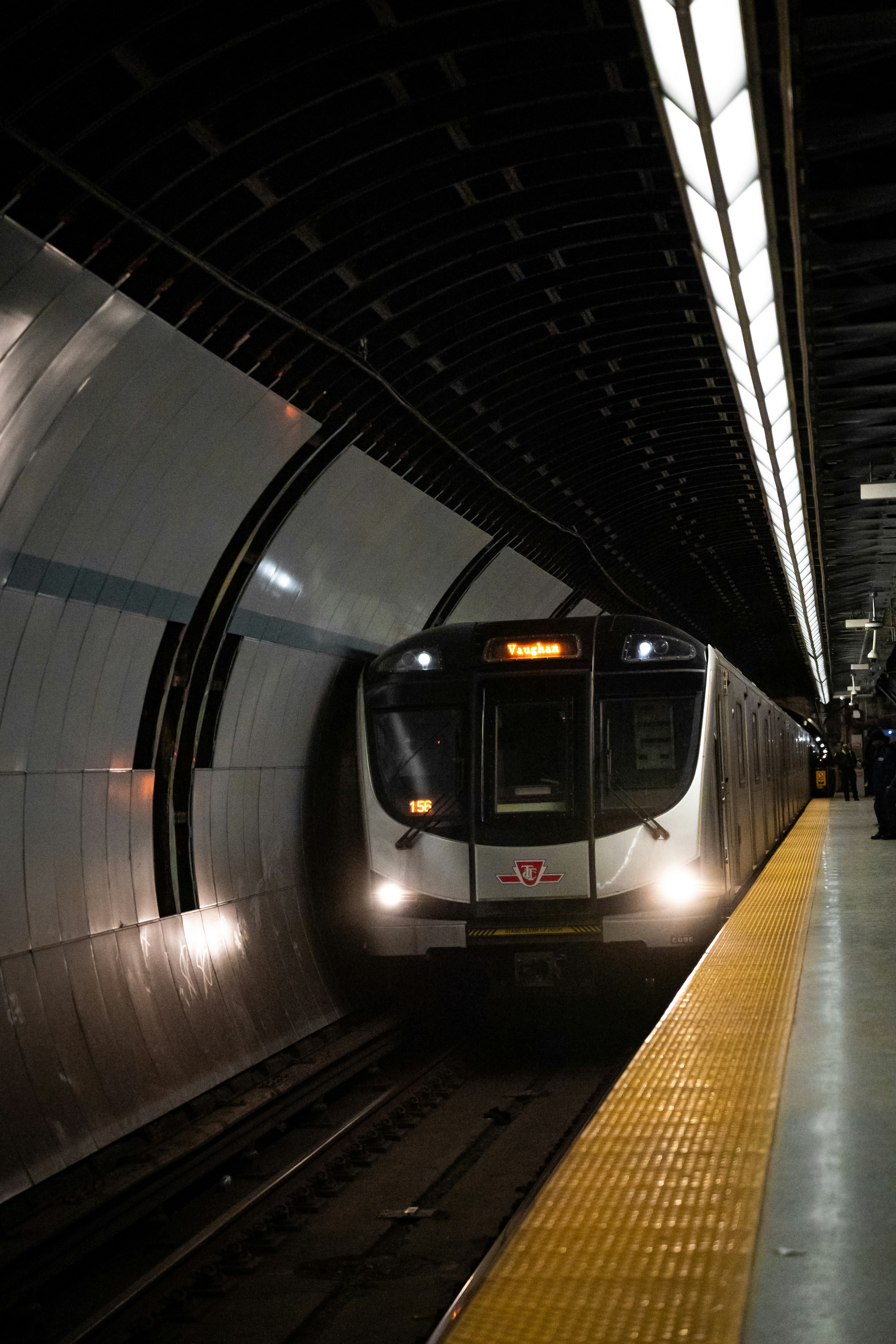 A subway train pulling into a subway station photo – Free Rail Image on ...