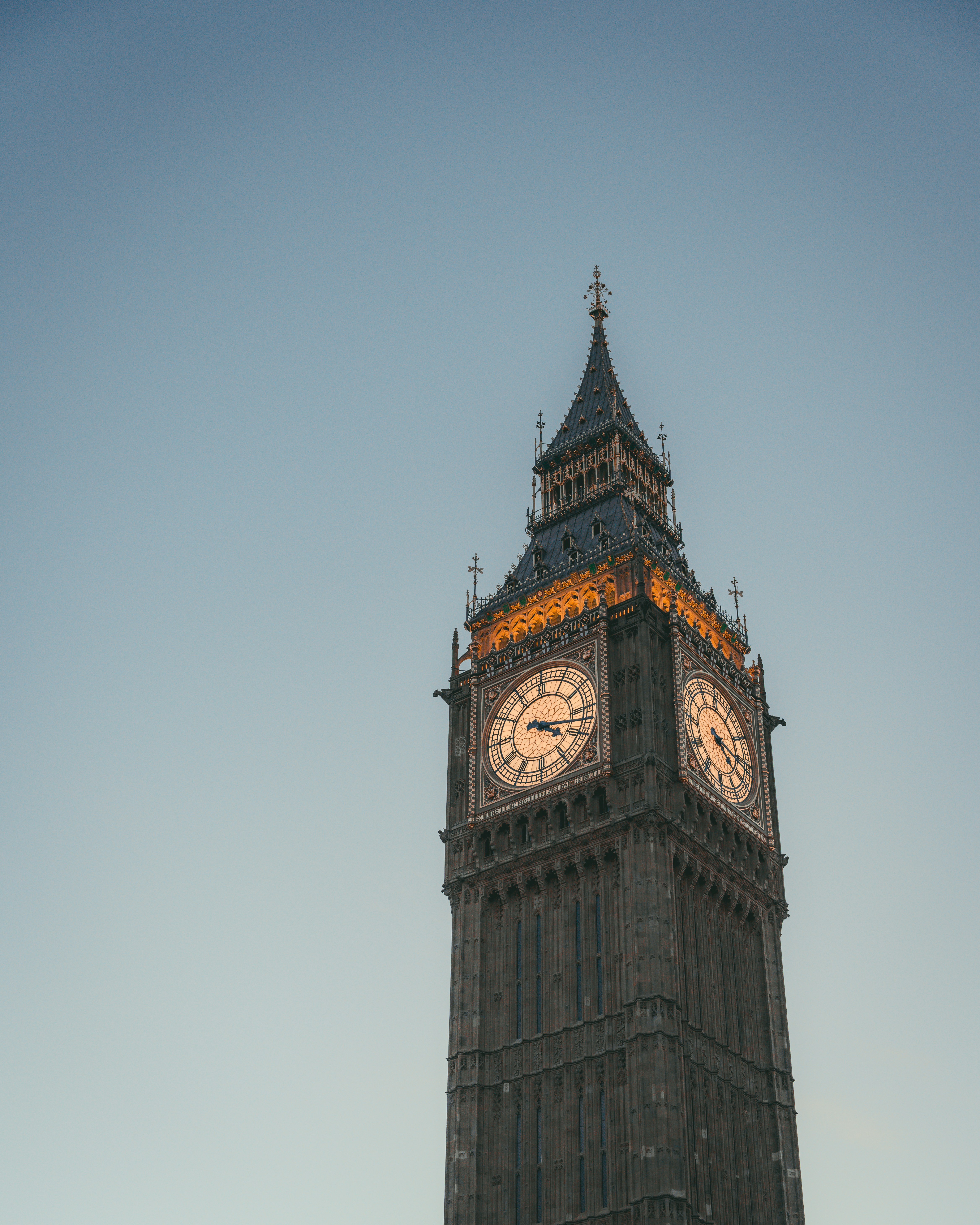 A tall clock tower with a clock on each of it's sides photo – Free Big ...