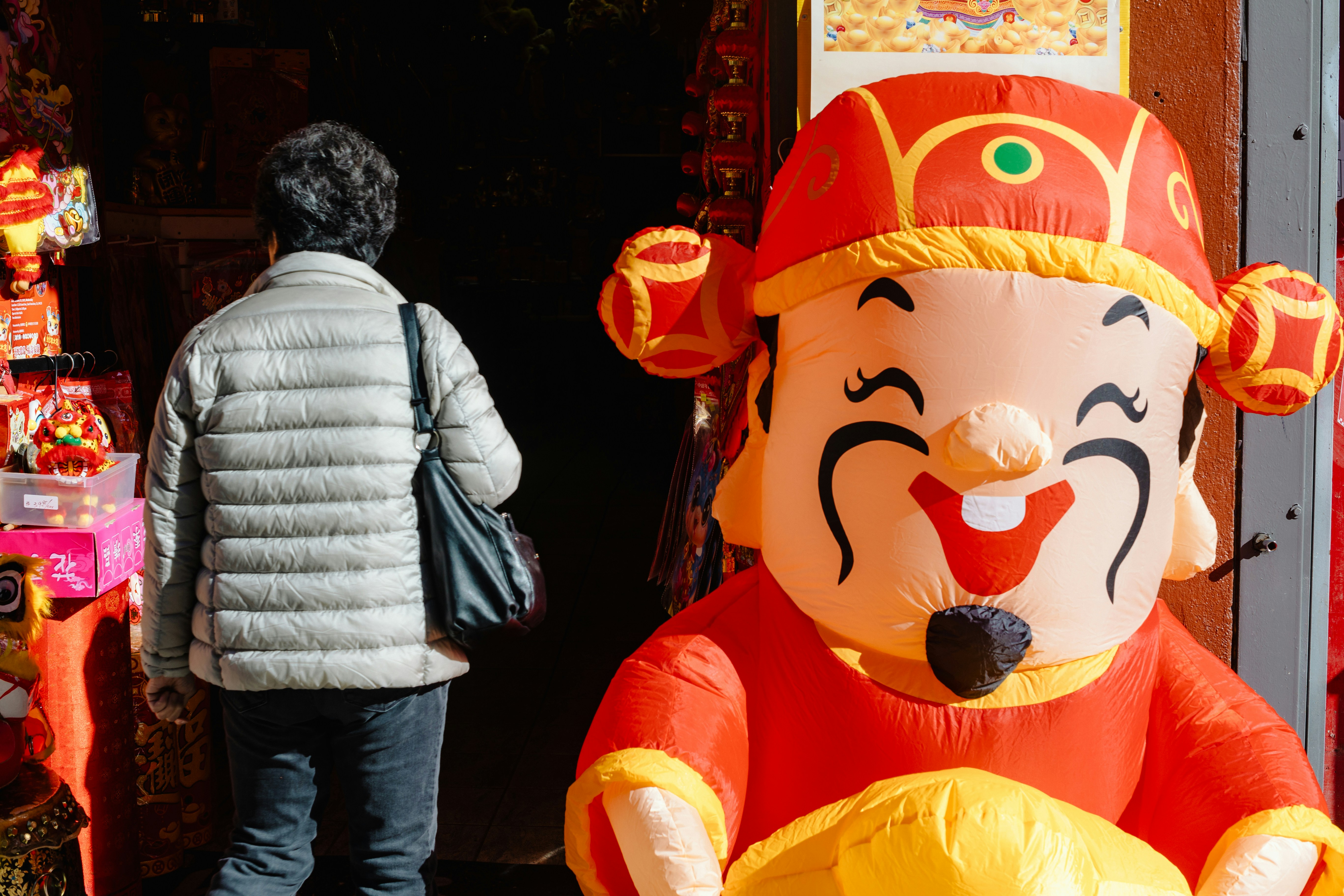 A person standing in front of a large inflatable character photo – Free ...