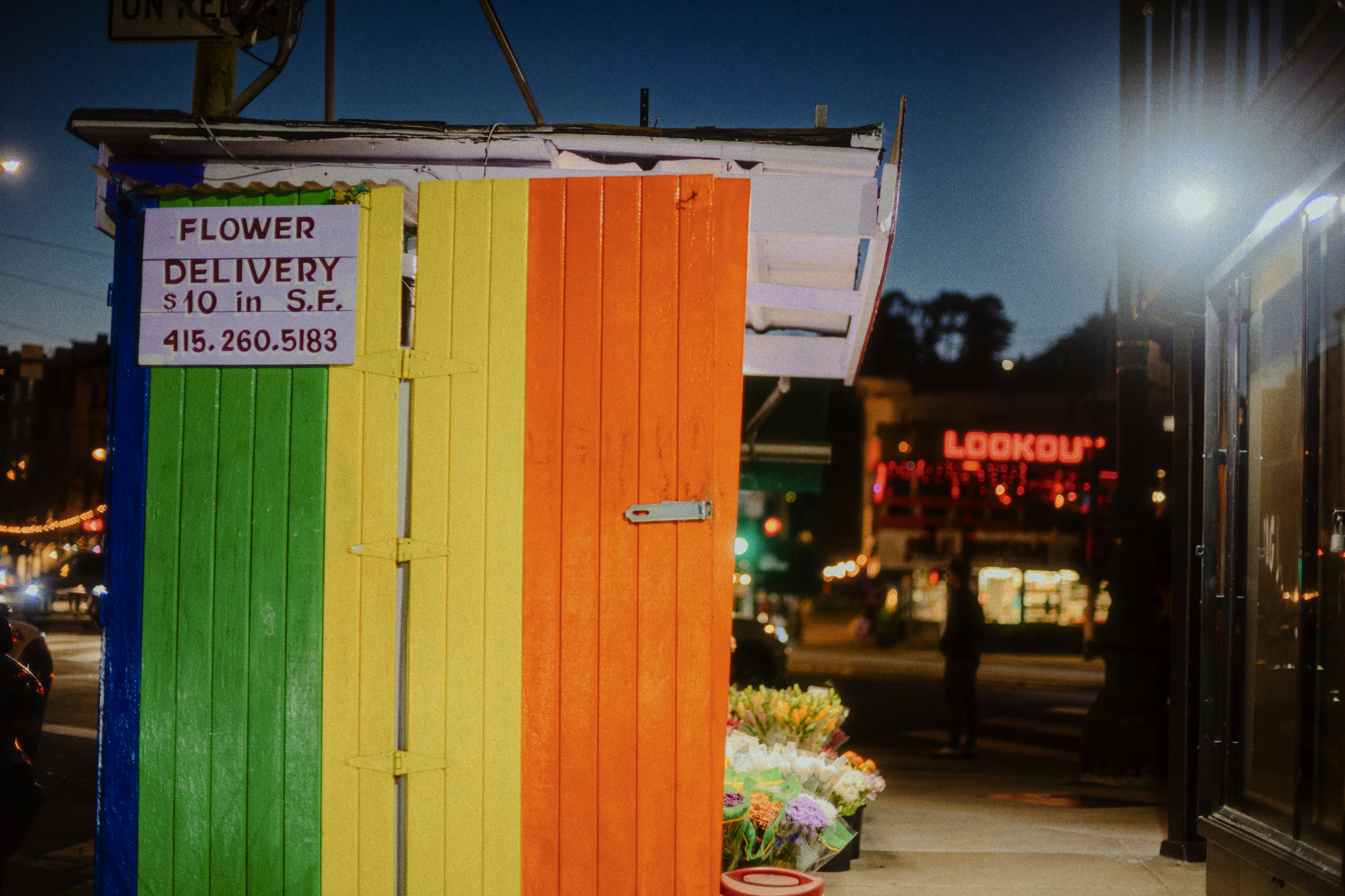 Rainbow Shed on a Neon Night