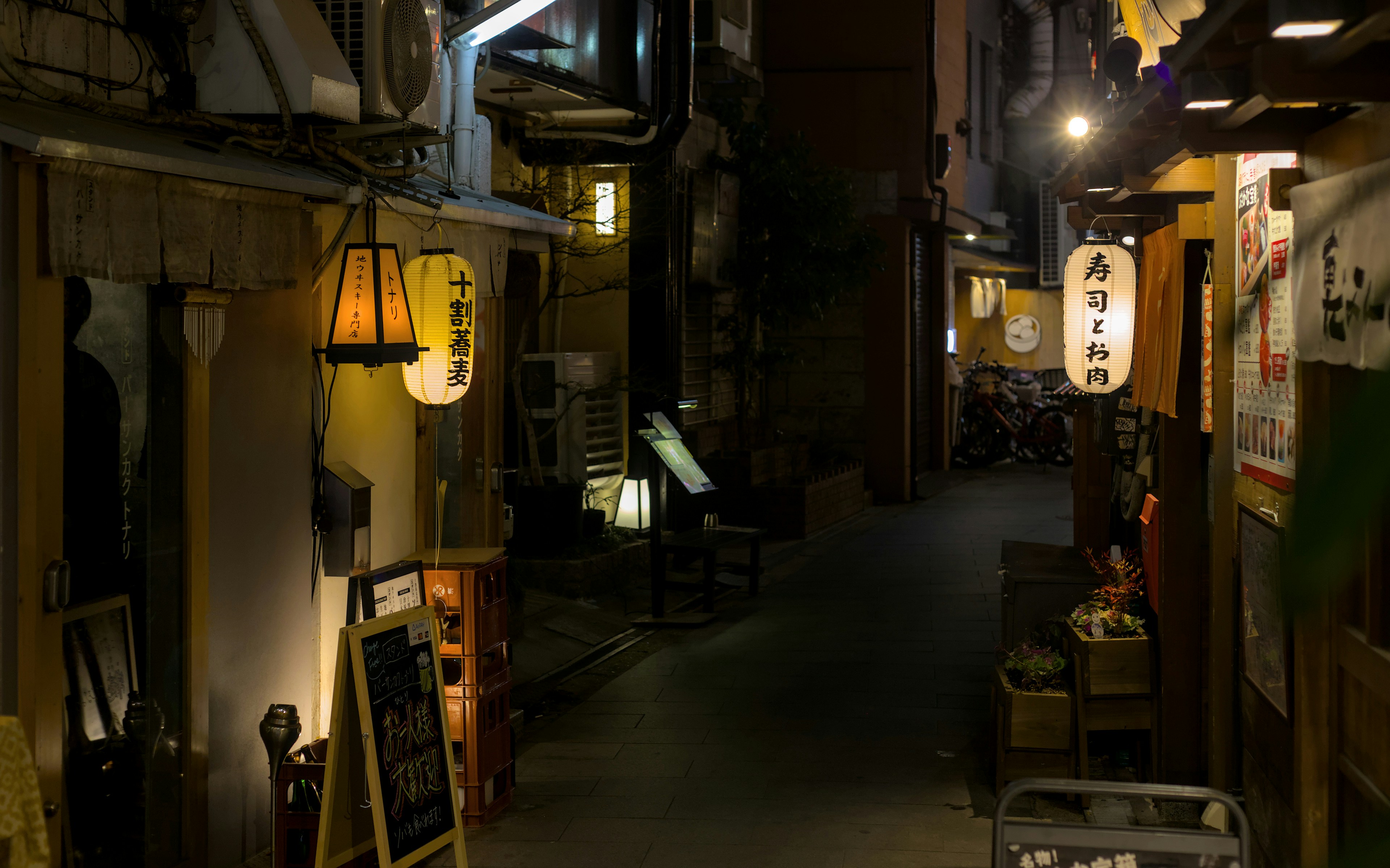 A narrow alley way with signs and lights photo – Free Osaka Image on ...