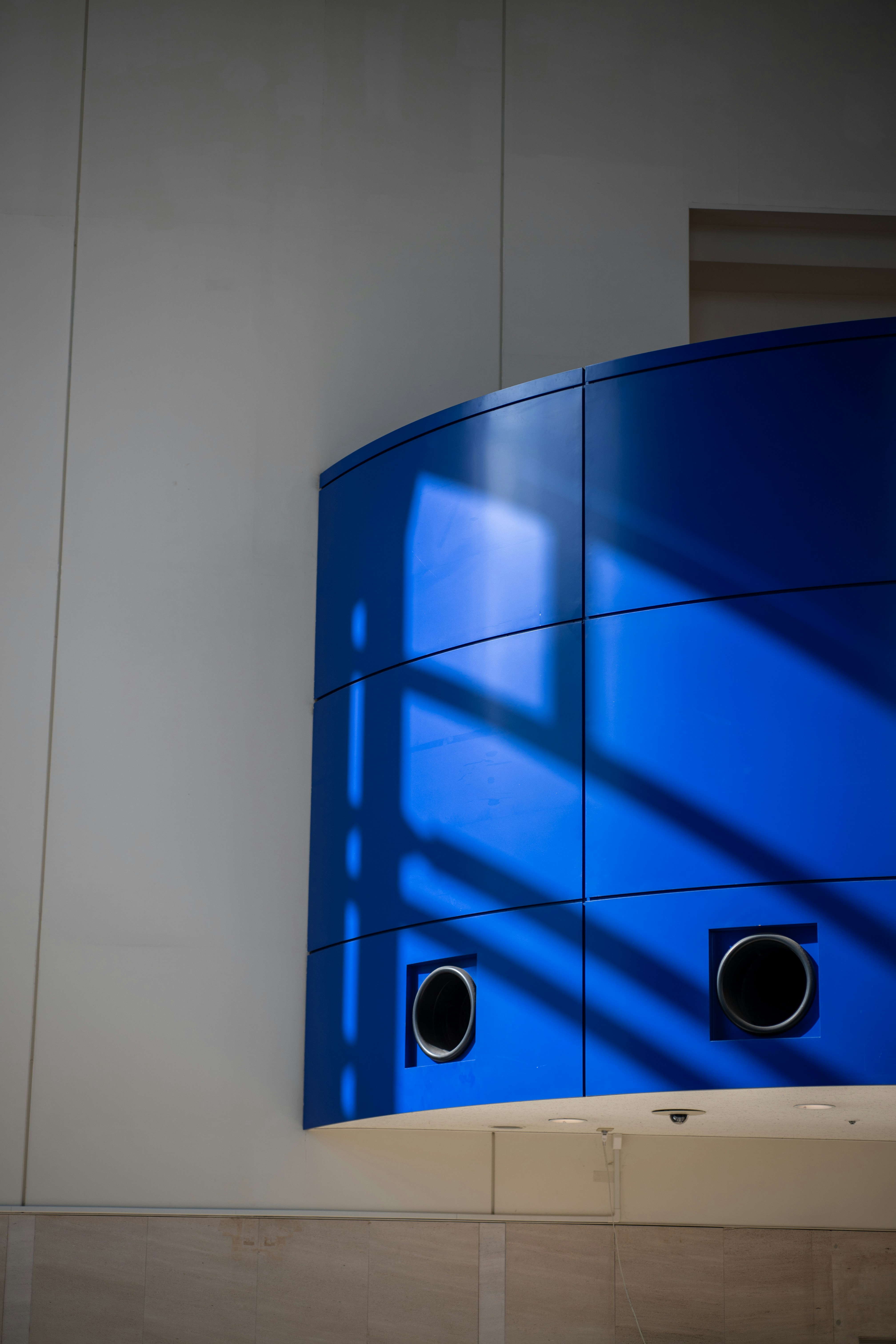 Blue Curves and Shadowed Lines at an Industrial Edge