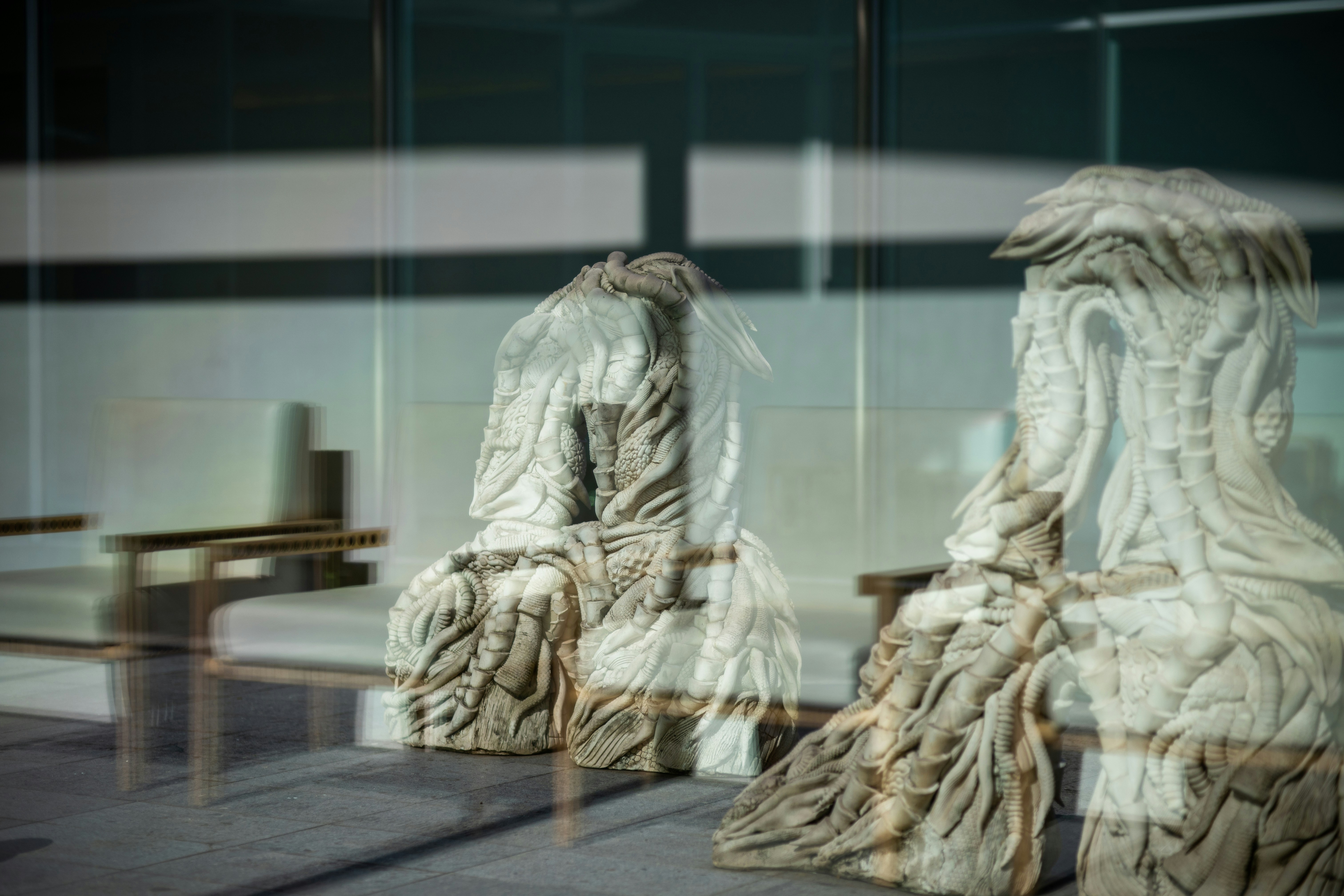 Echoes on Glass: Double Visage in a Quiet Lobby