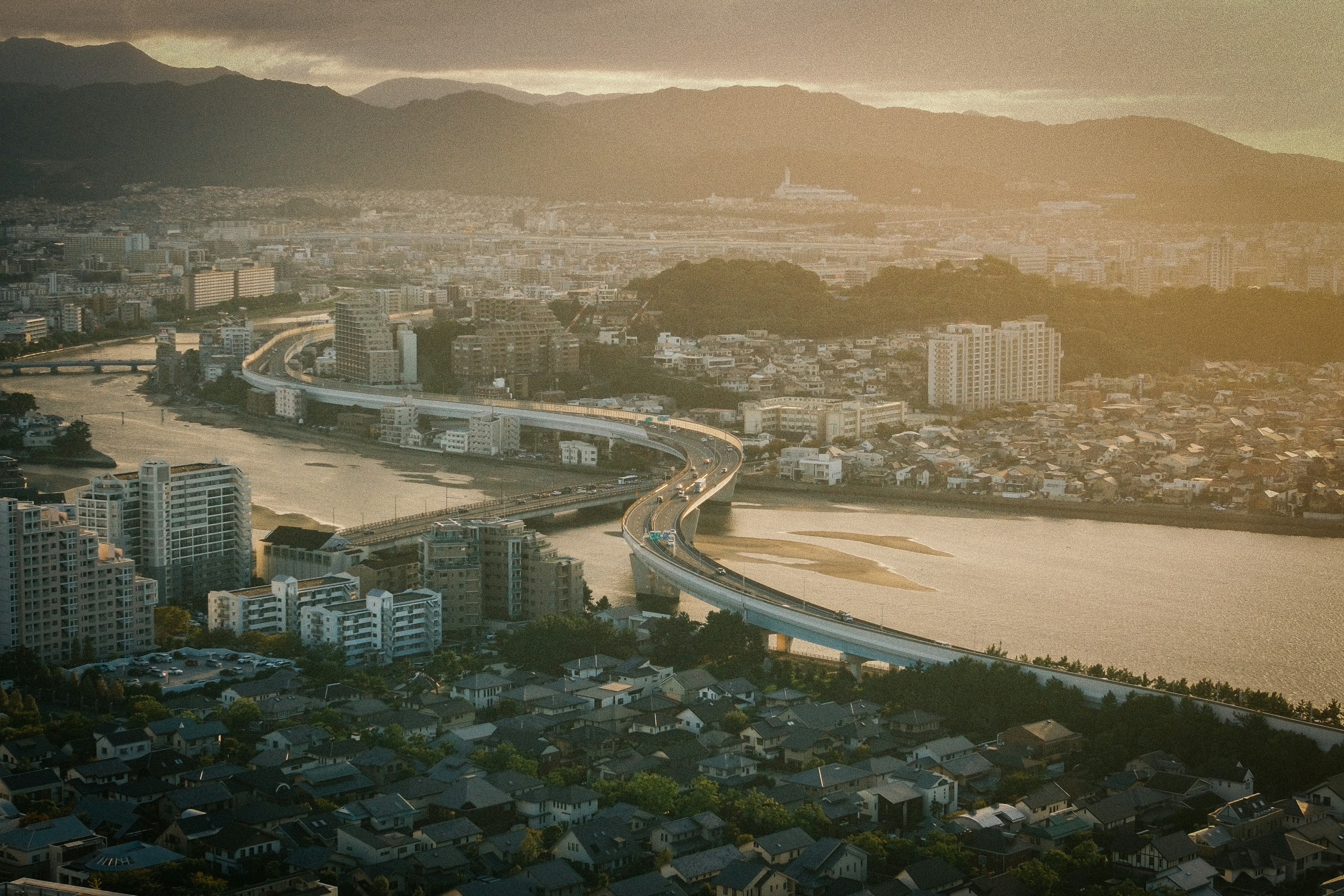 An aerial view of a city with a river running through it photo – Free ...