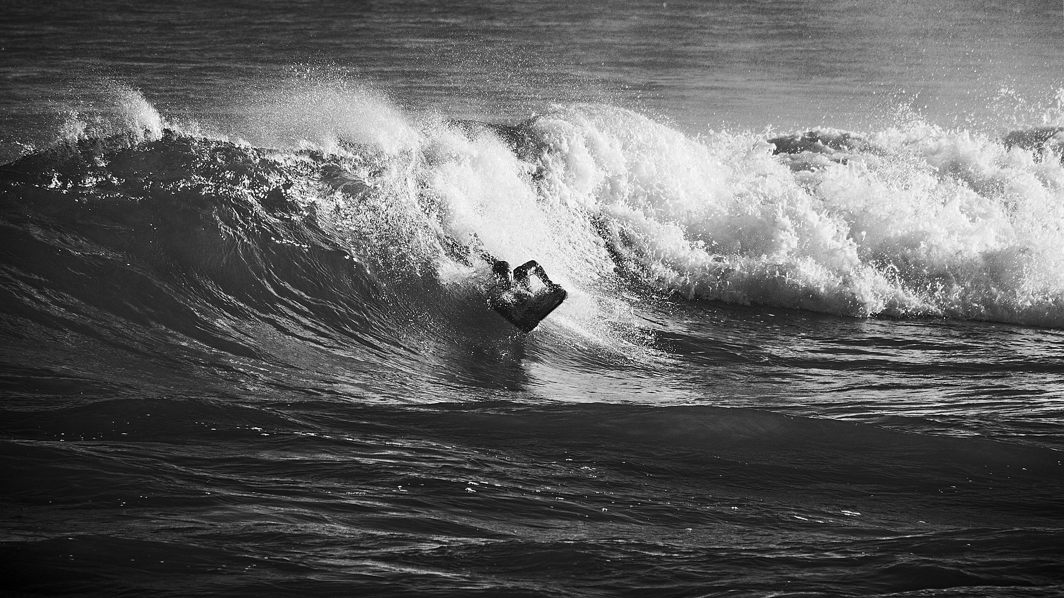 A man riding a wave on top of a surfboard photo – Free Nature Image on ...
