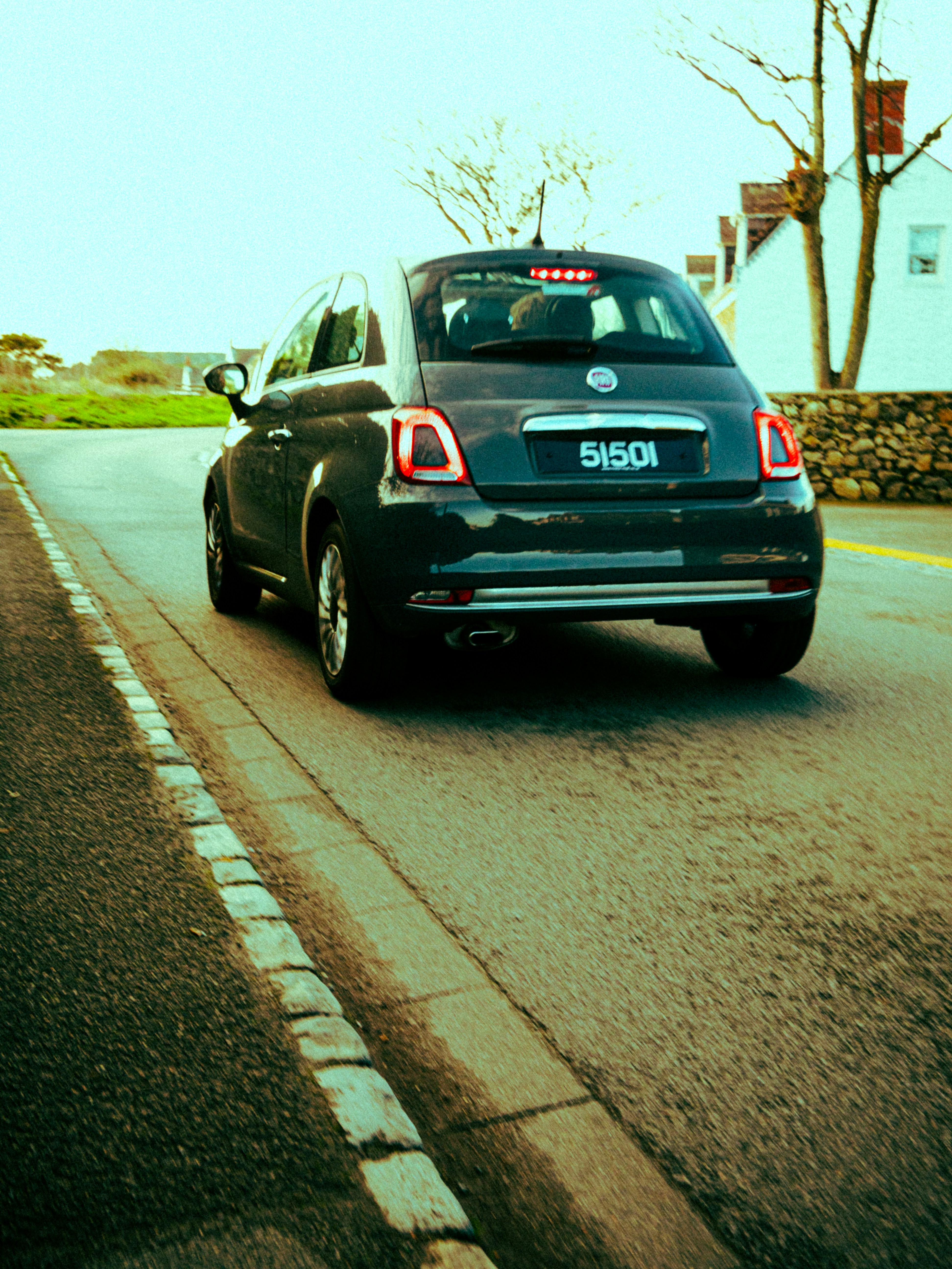 Urban Escape: A Fiat's Journey Down the Open Road