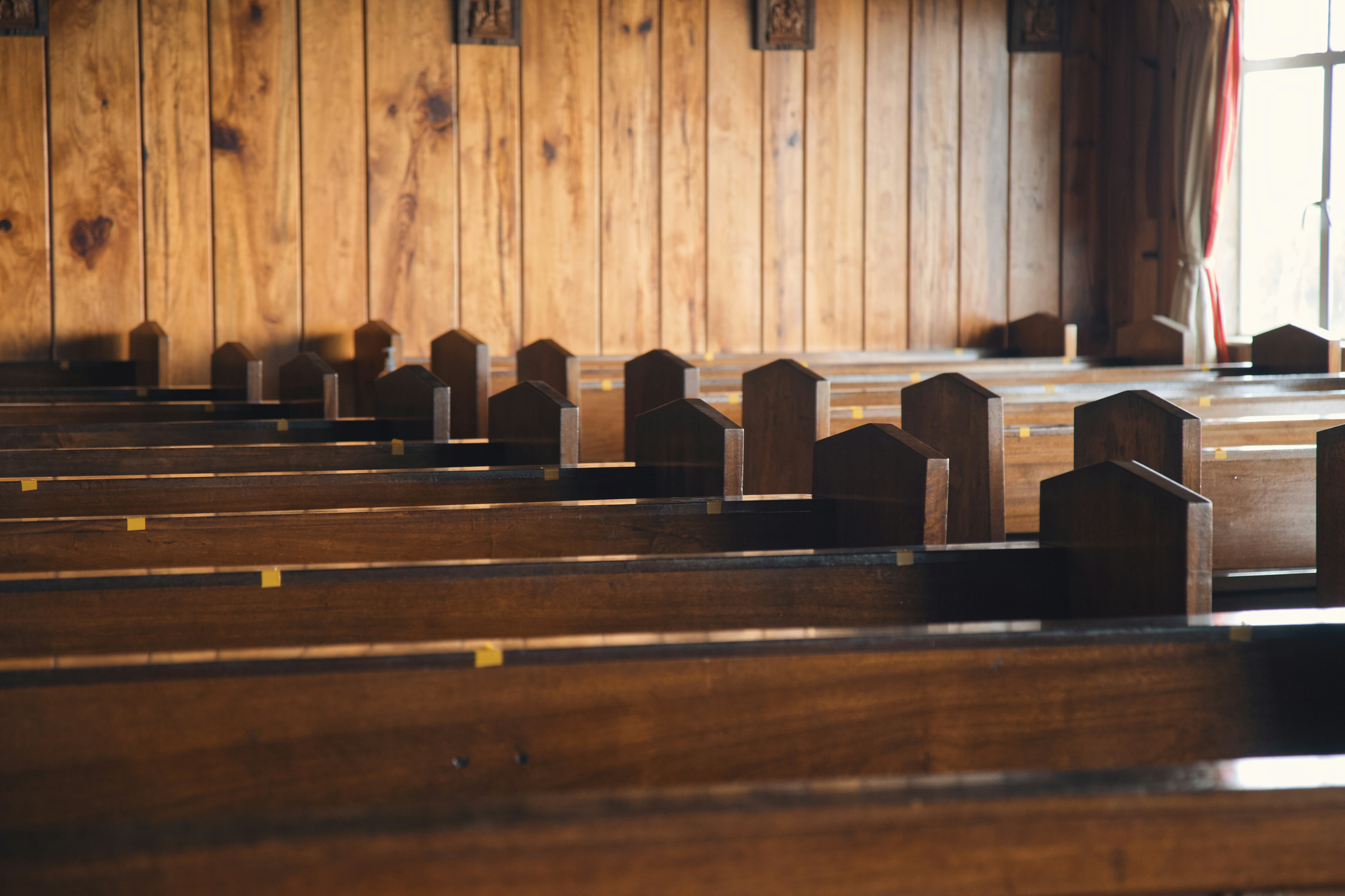 Rows of pews in a church with wooden walls photo – Free Building Image ...