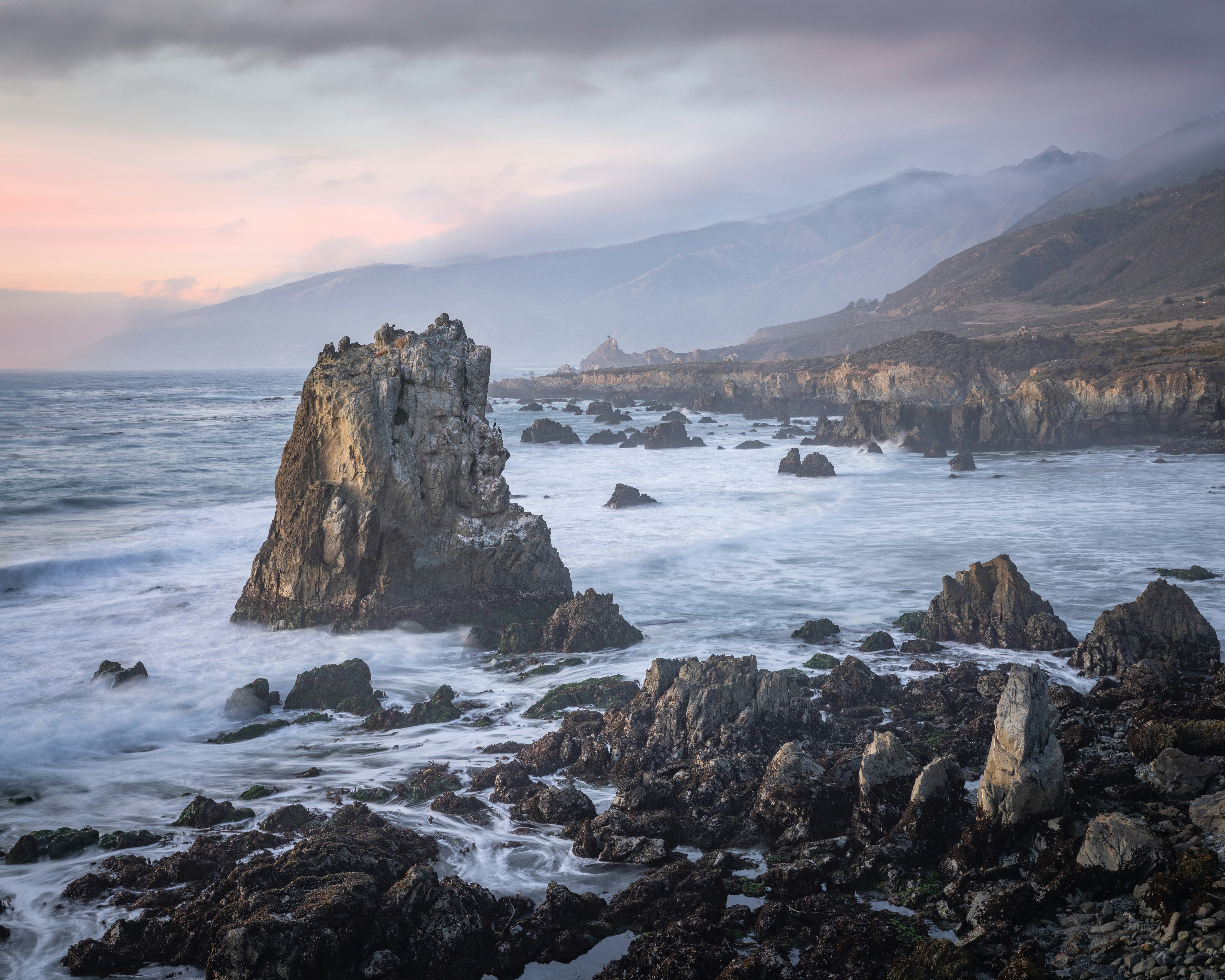 Ocean's Edge at Dusk: A Rugged Serenity