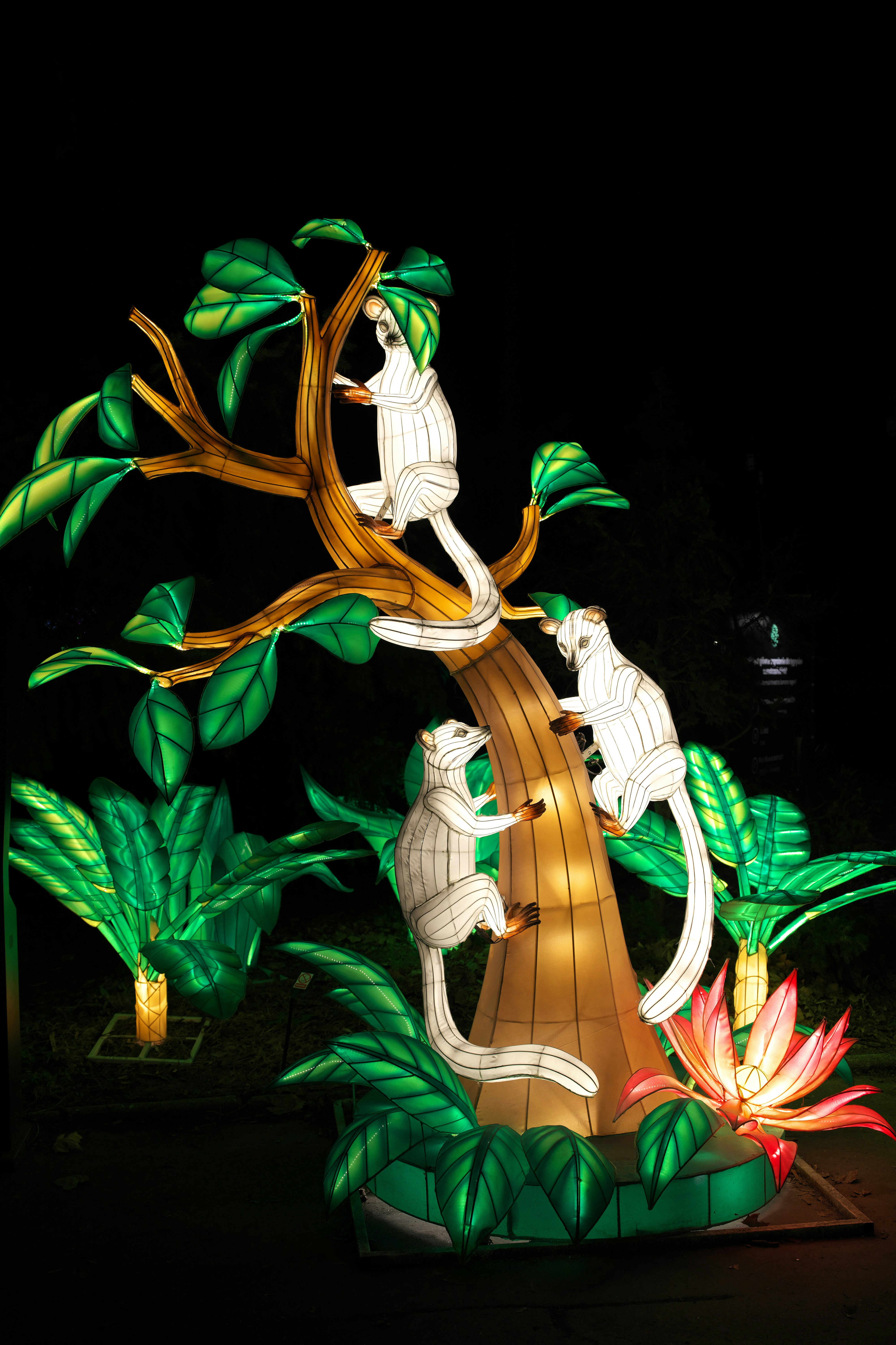 Luminous Monkeys in Neon Foliage