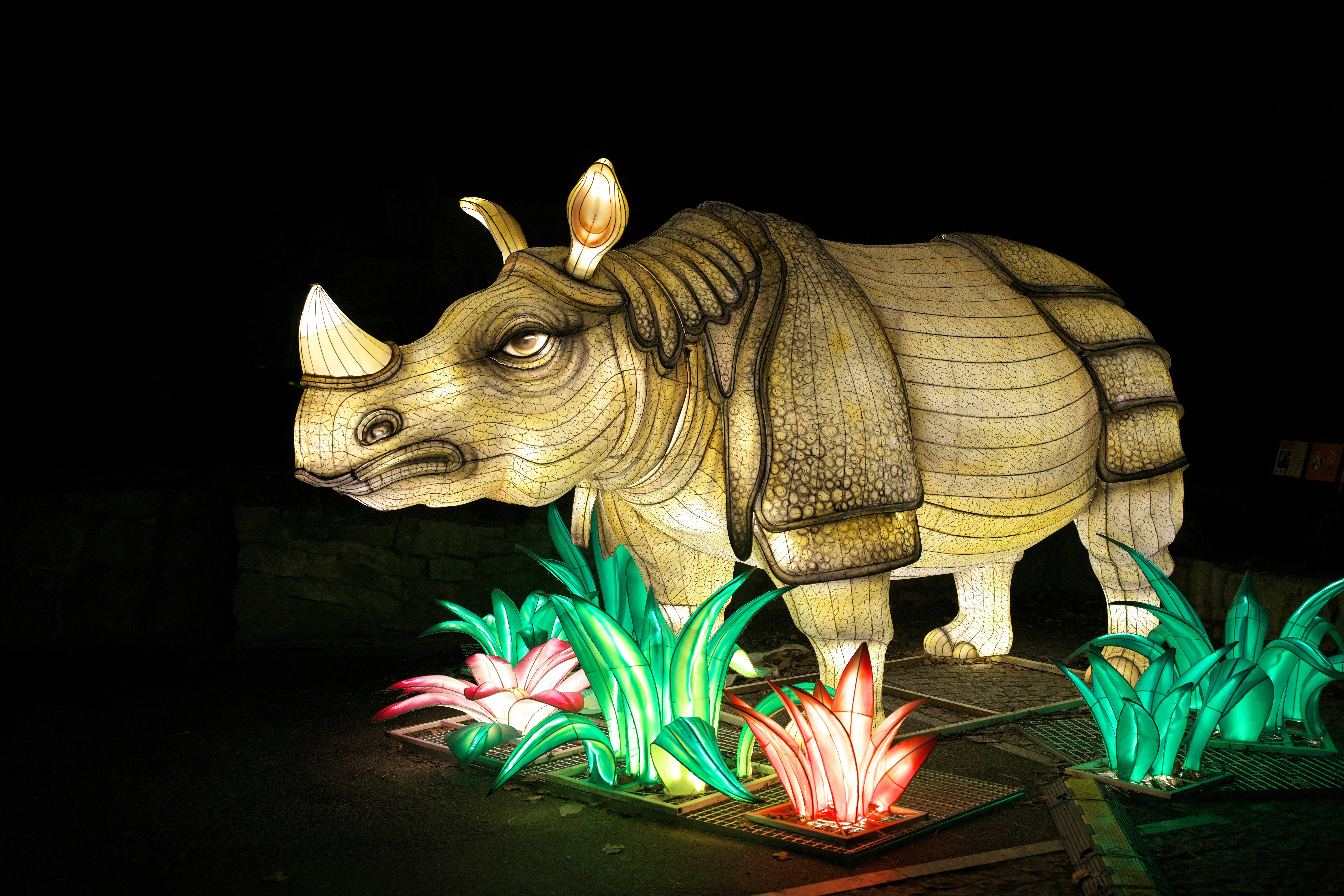 Luminous Armor Rhino Under Neon Foliage