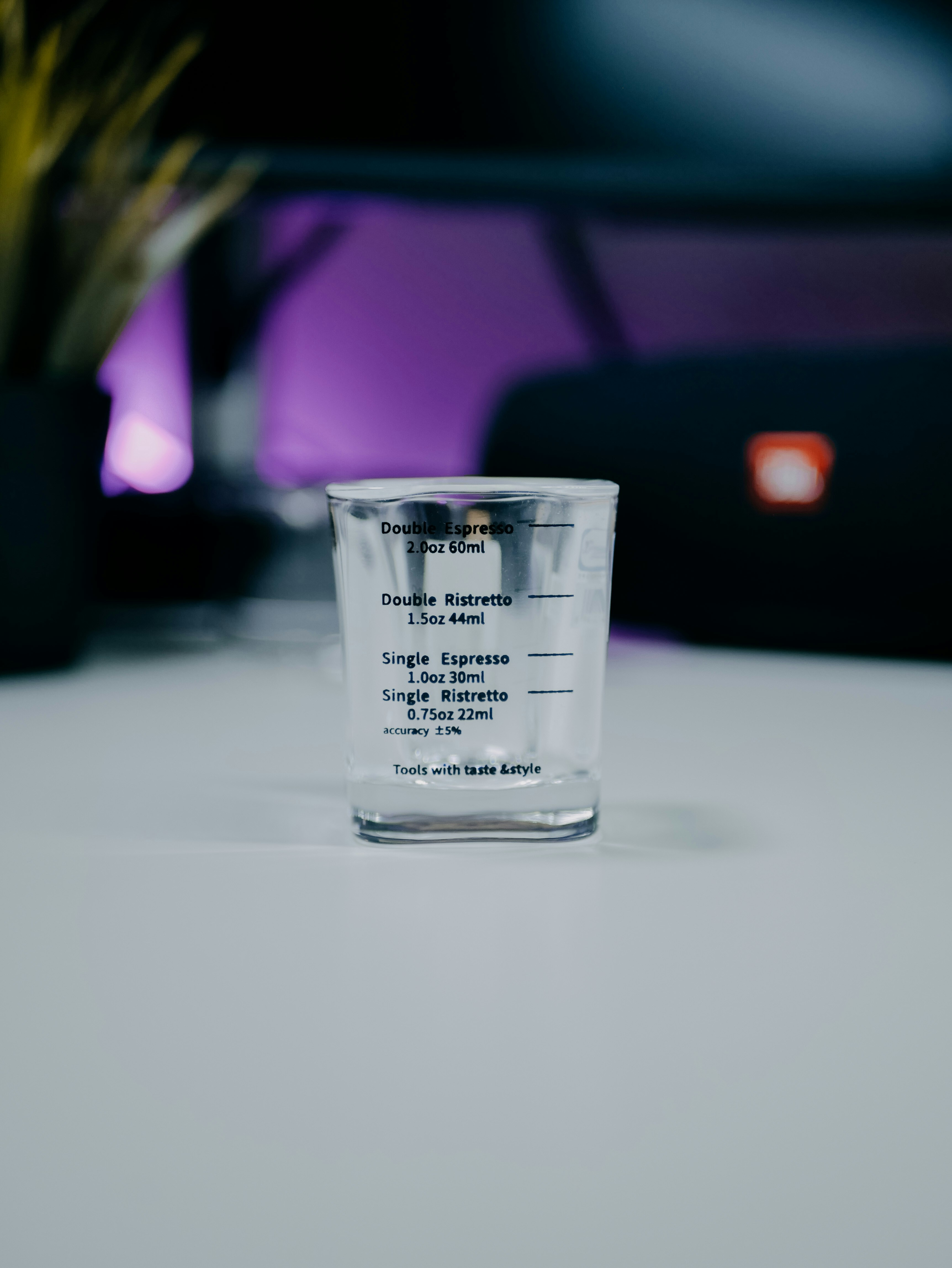Focus in a Petite Glass: Quiet Clarity on a White Desk